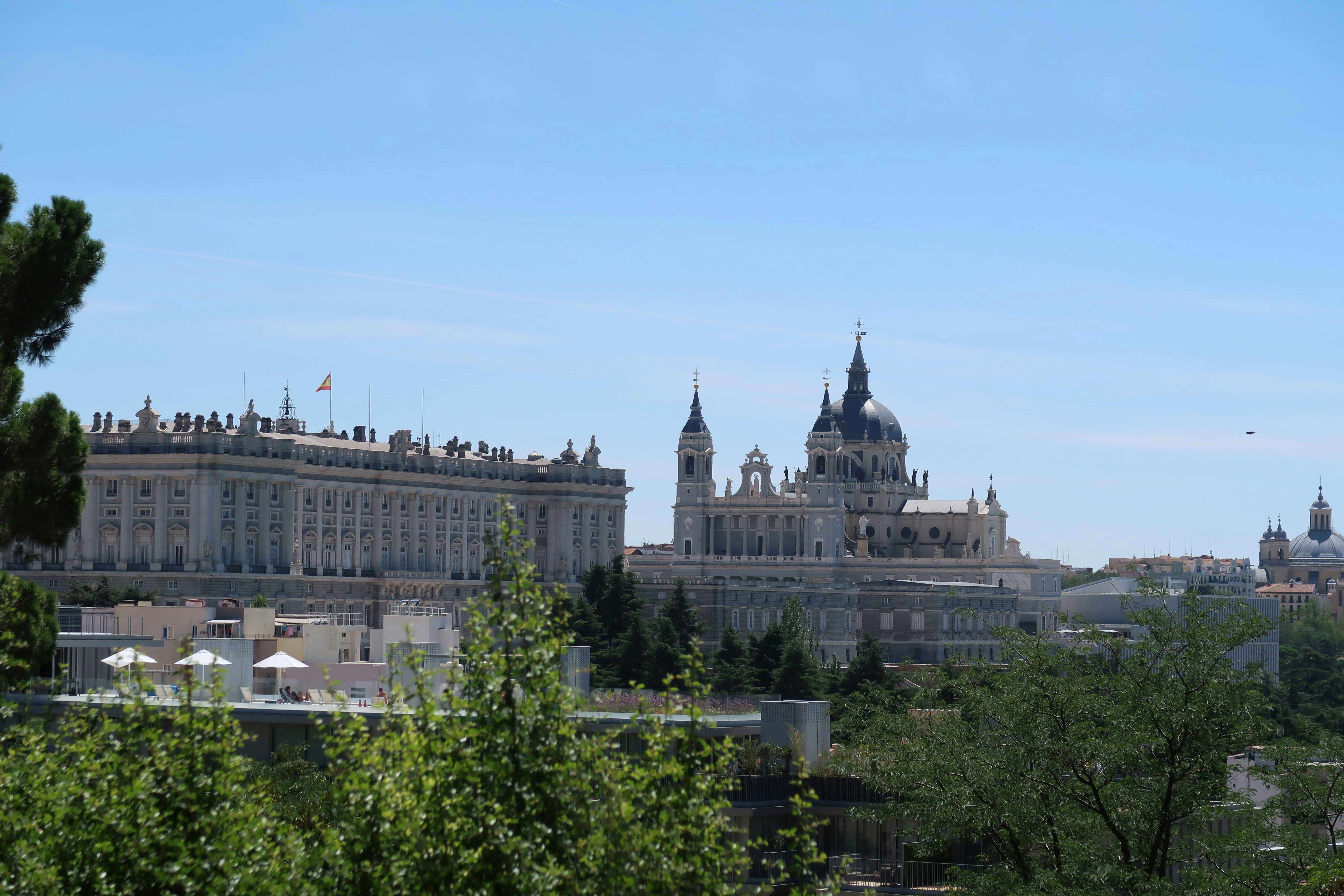 Rising Cathedral and Civic Skyline Under a Clear Blue Madrid-like Sky