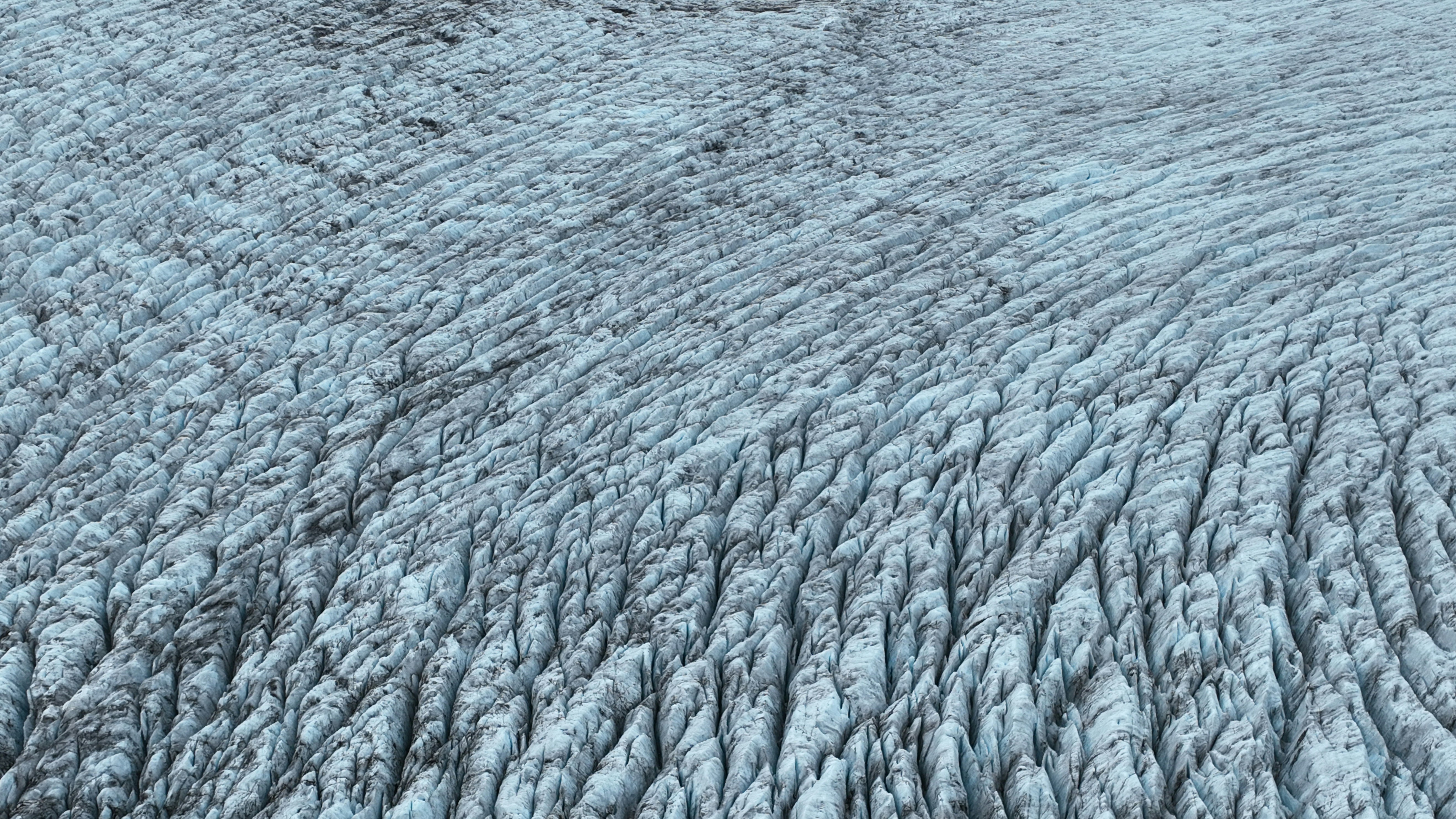 Ridges of Ice: A frozen whisper across a snow-textured expanse