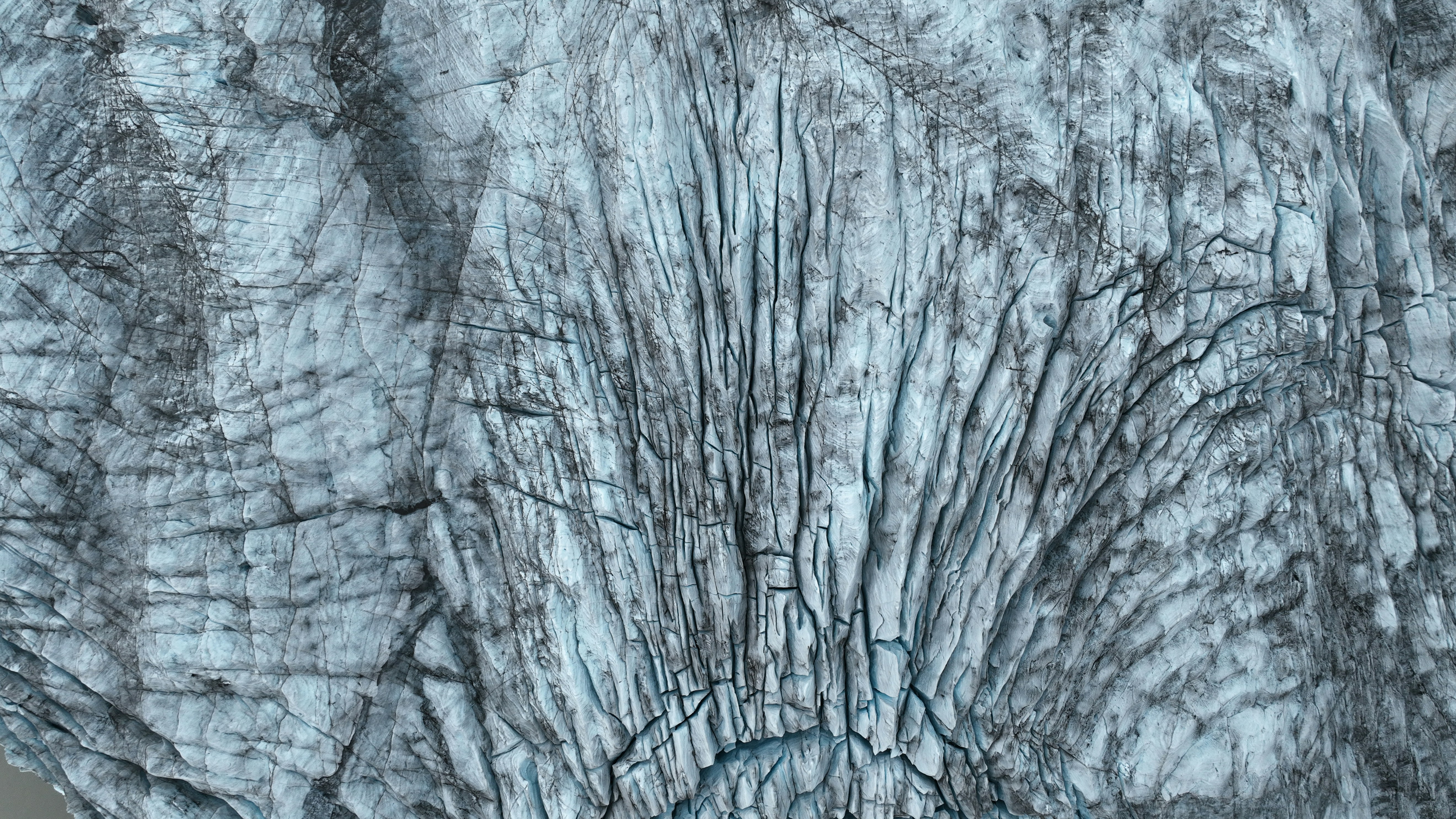 Glacial Veins: Cracked Ice Patterns Revealing Ancient Flow