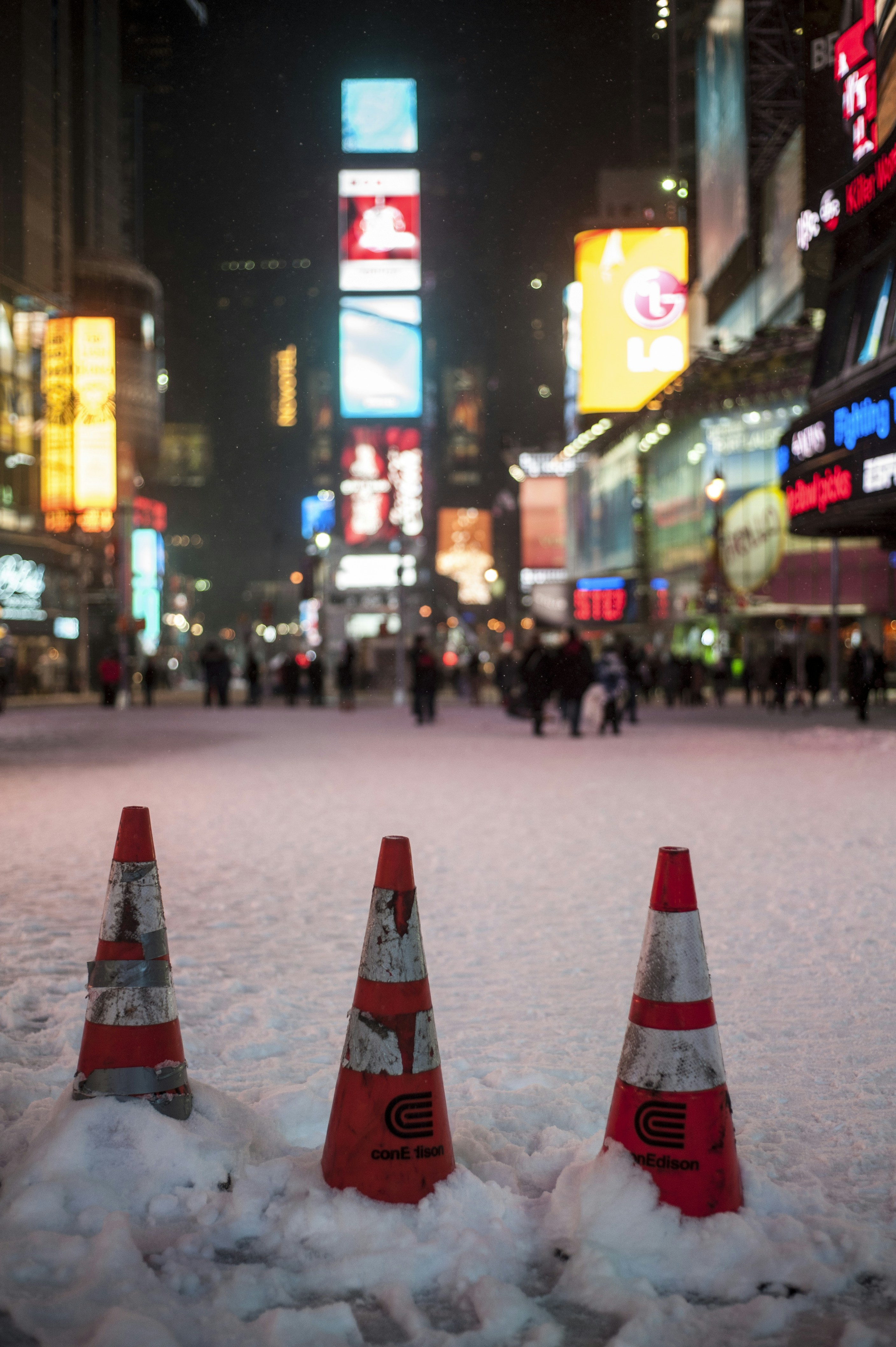 Snowy Times Square: Traffic Cones and Neon Echoes