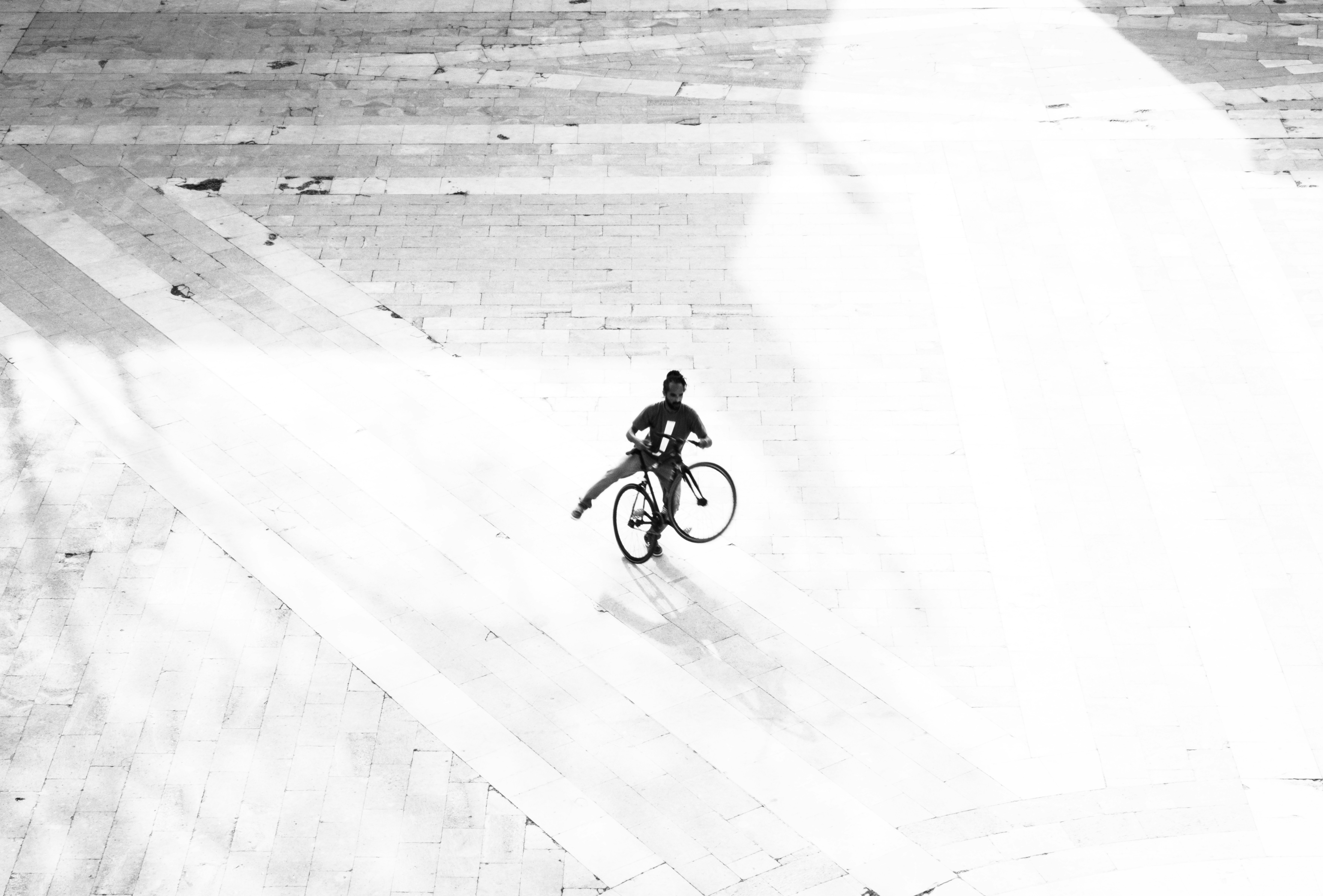 High-Contrast Solo Ride in an Empty Concrete Vista