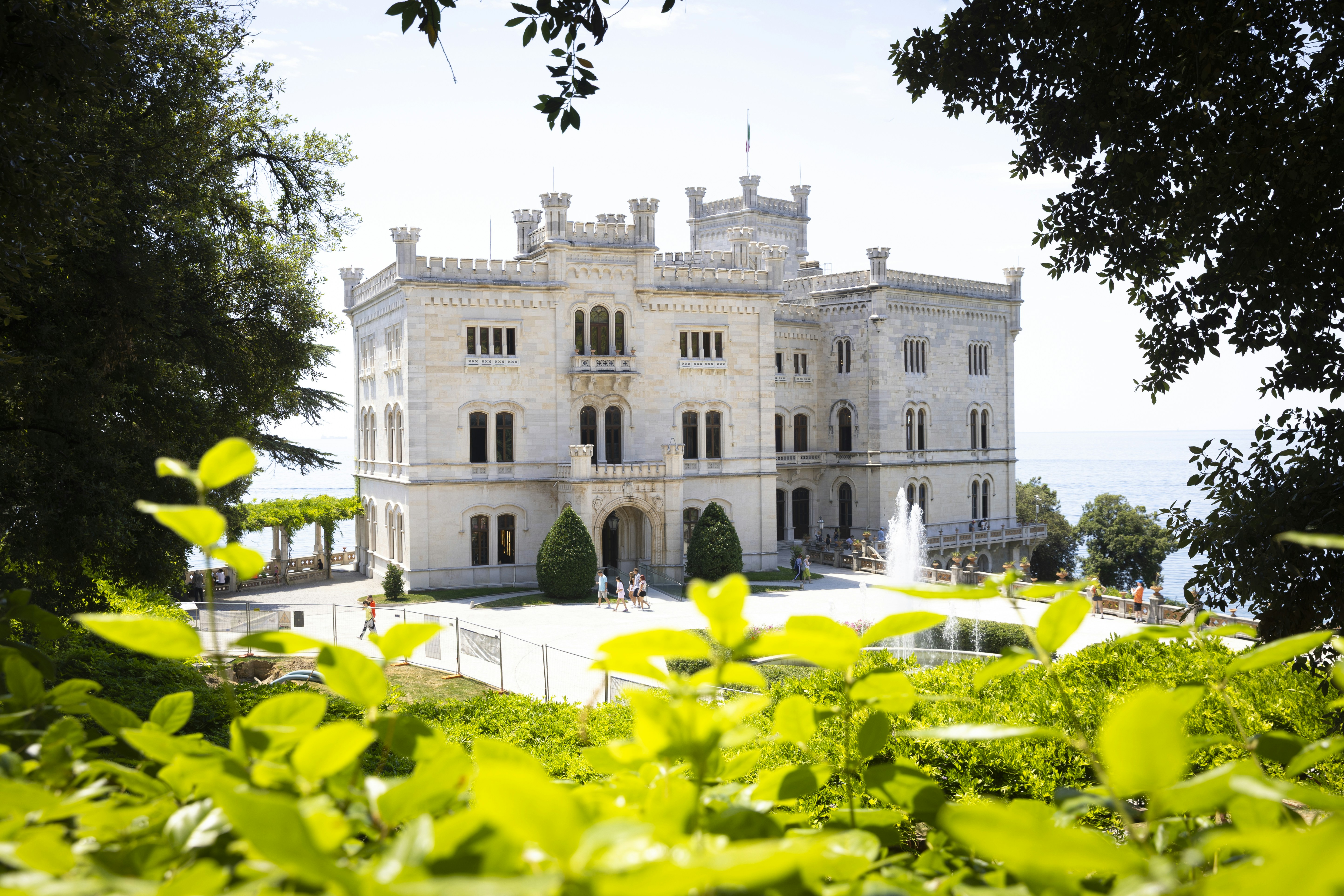 Sunlit Castle of the Riviera: A Verdant Forecourt Framing the Sea