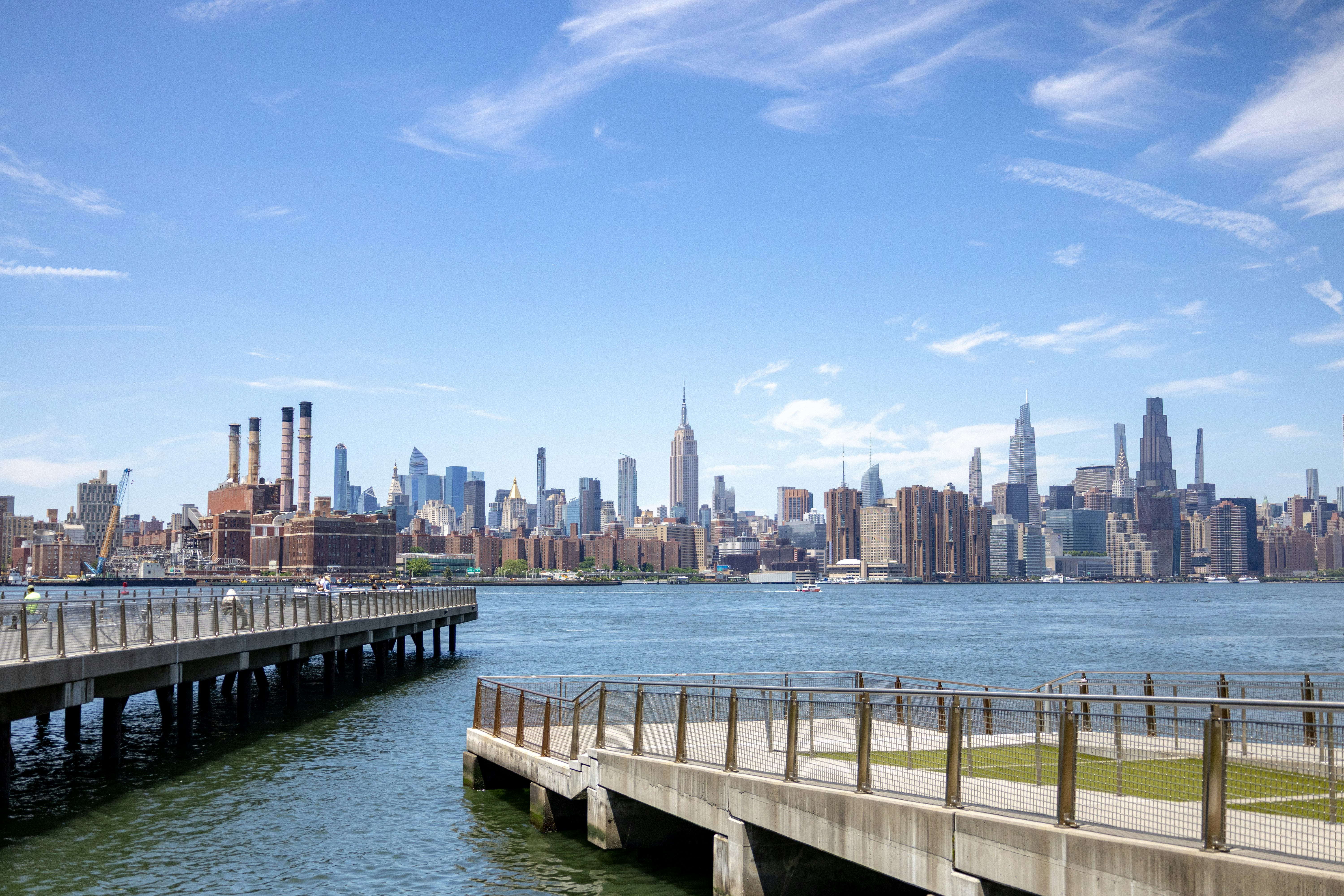 Harbor Skyline: A Quiet Pause by the Wooden Promenade