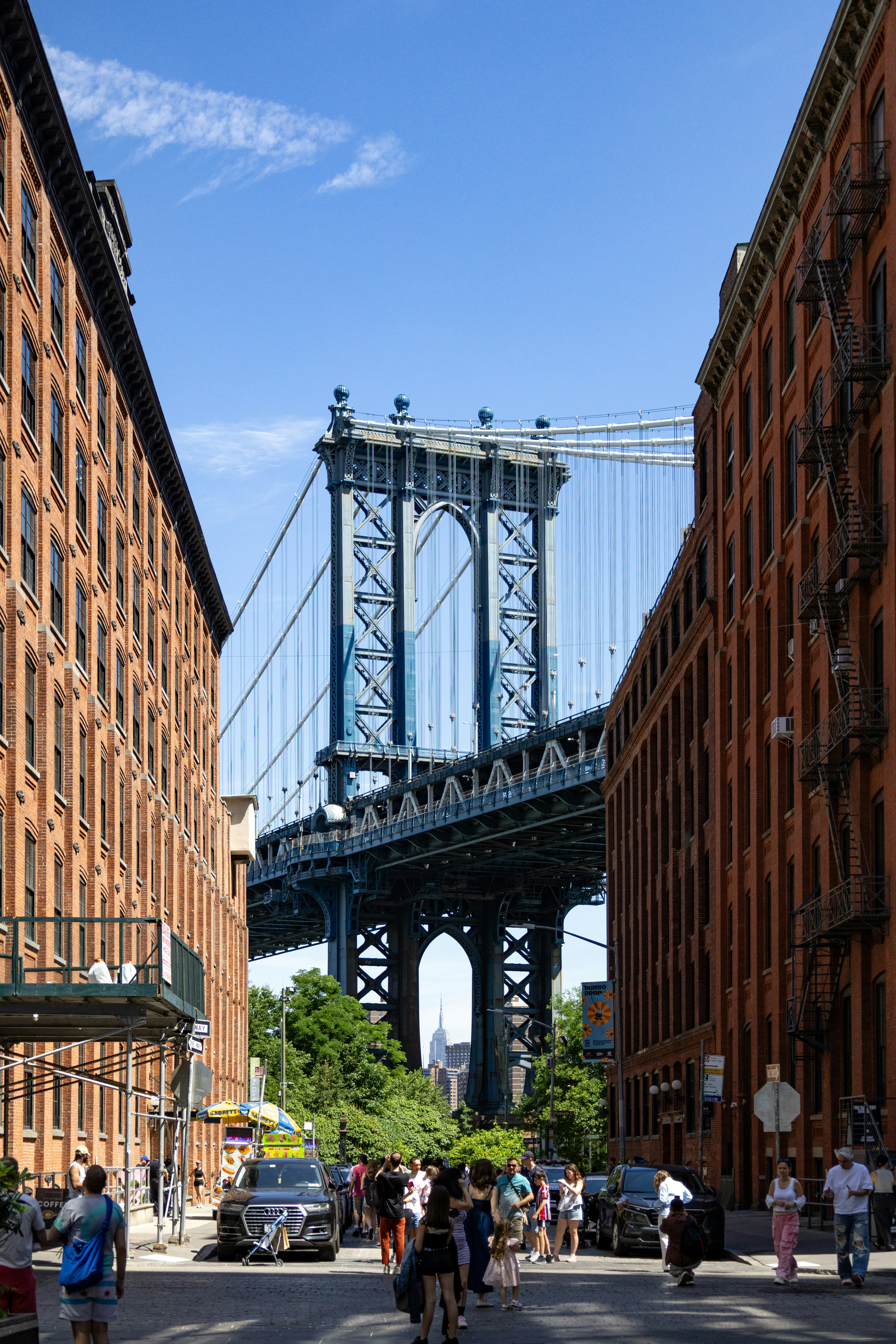 Urban Gateway: The Manhattan Bridge Framed by Brick Canyon