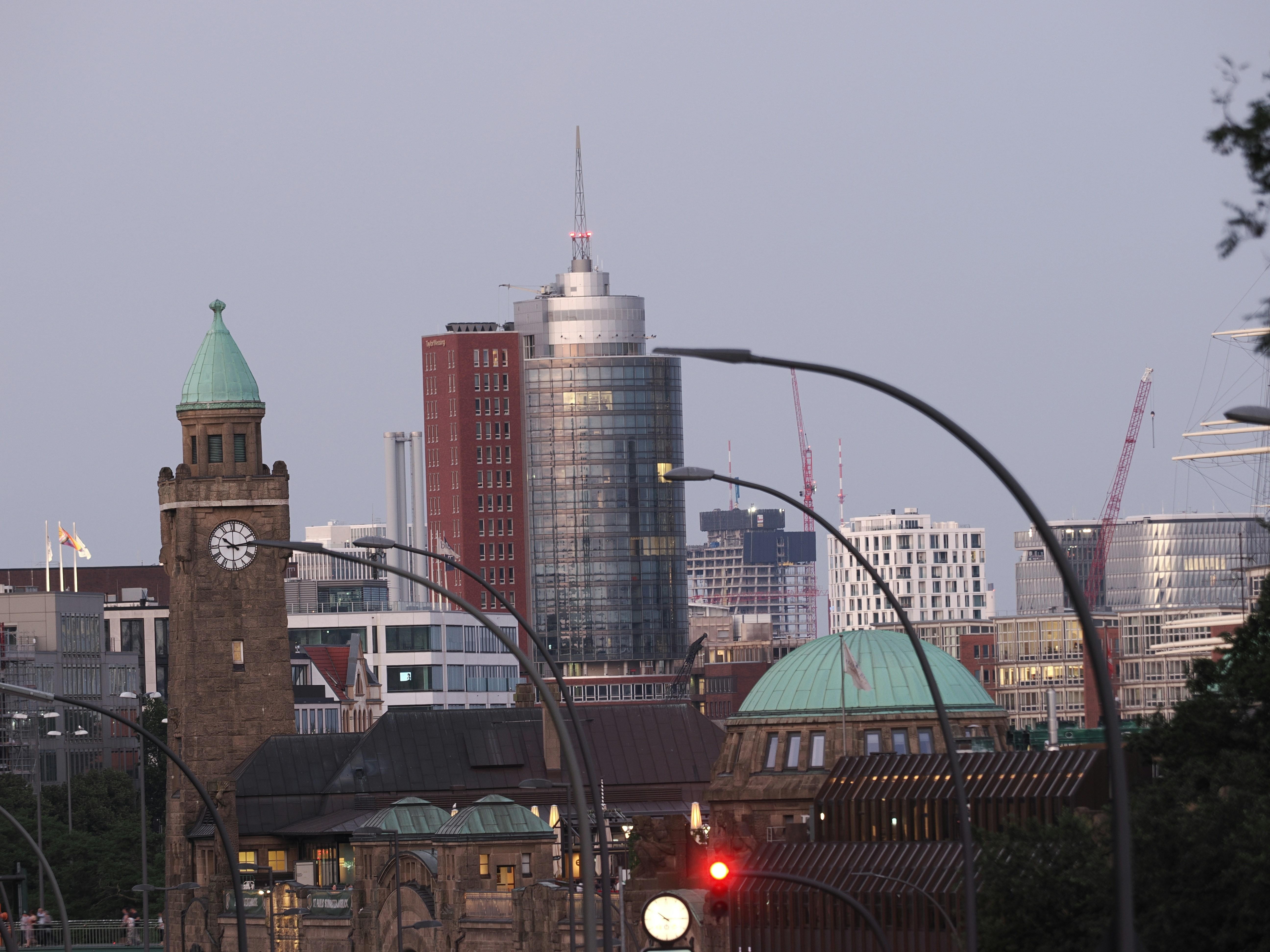 City Clock and copper-domed skyline rising above a street grid