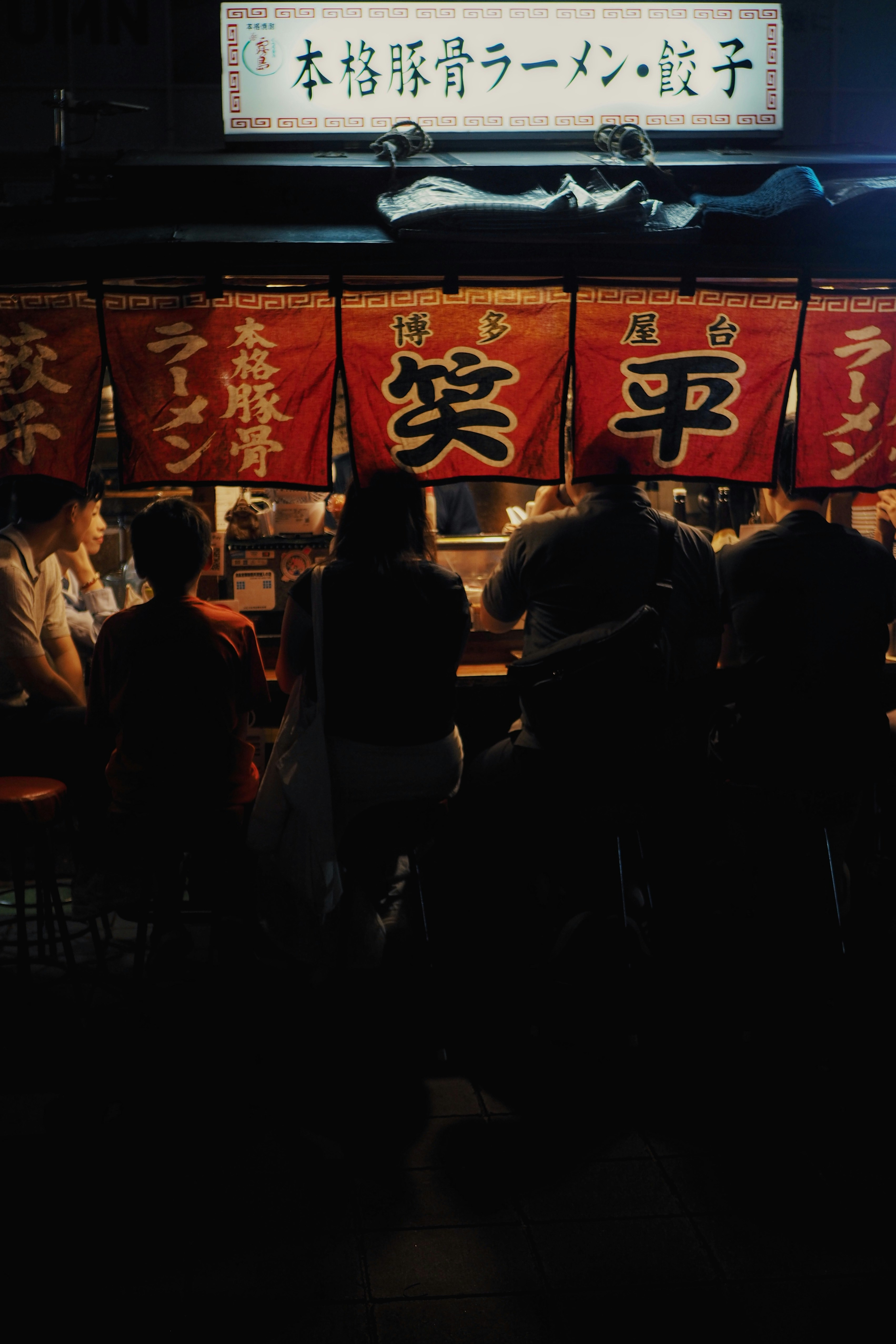 Night Market Ramen Stall: Faces in the Glow of Red Lanterns