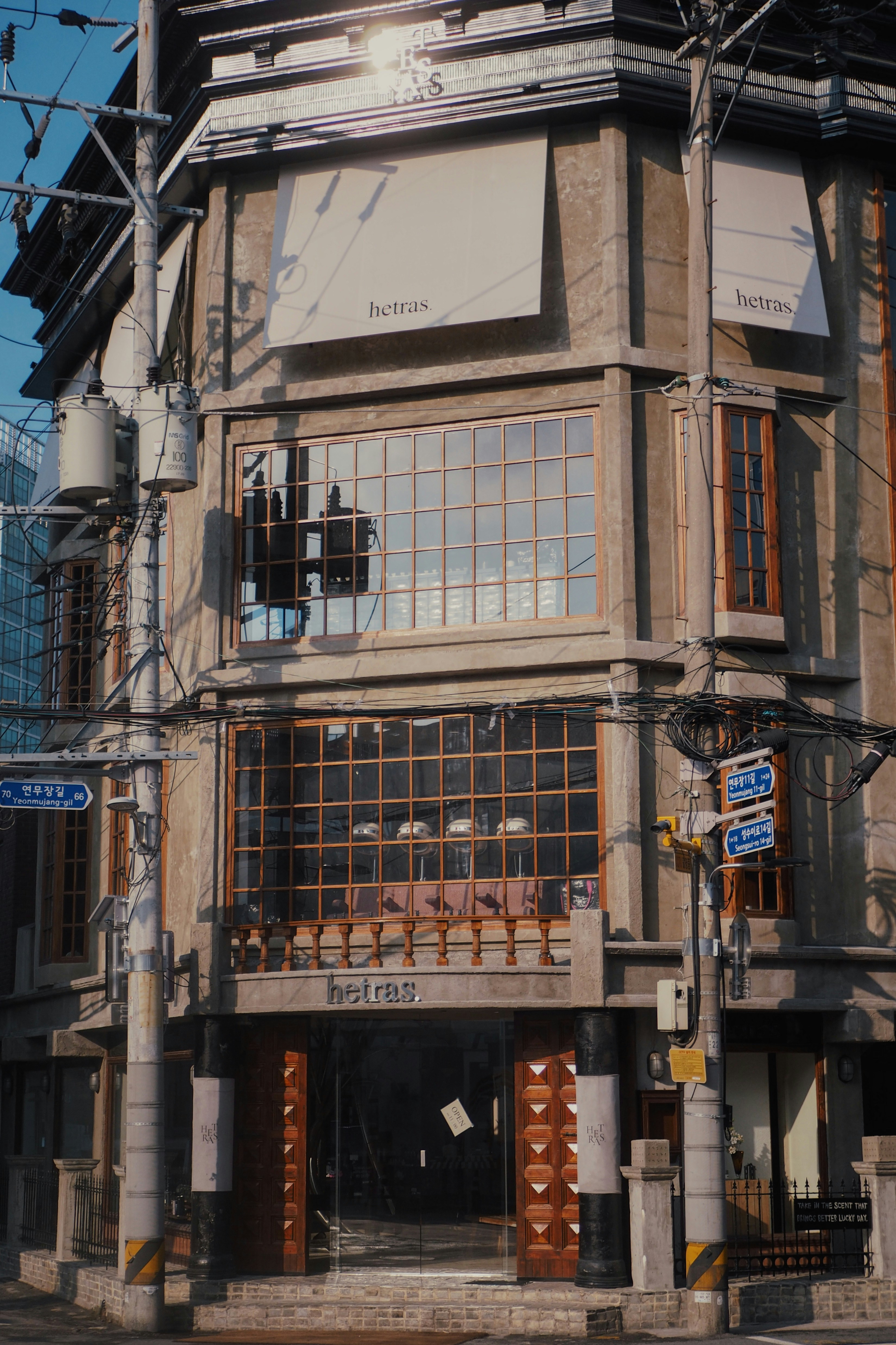Urban Facade: Glass and Timber in Afternoon Light