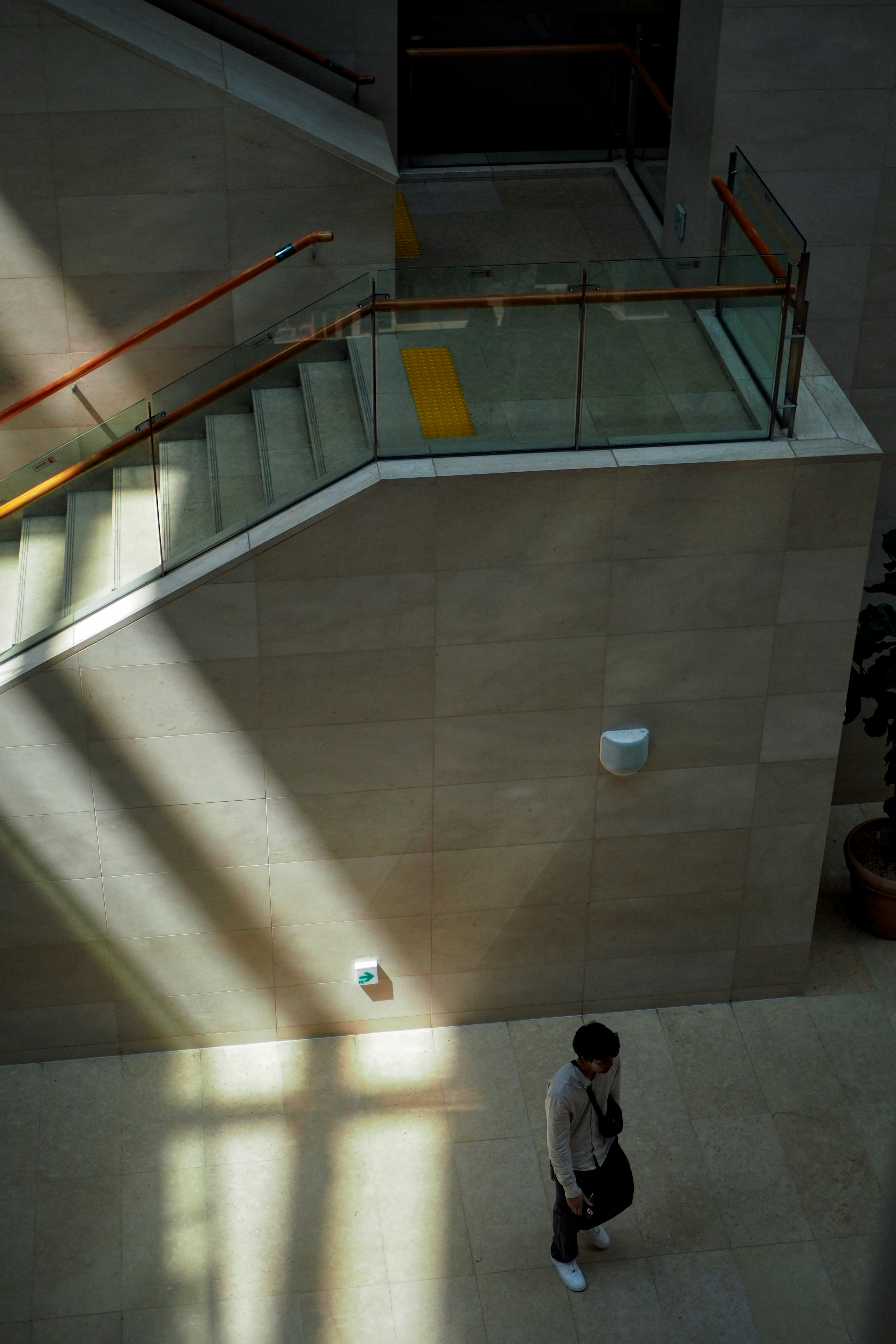 Quiet Figure in an Angle of Lighted Concrete