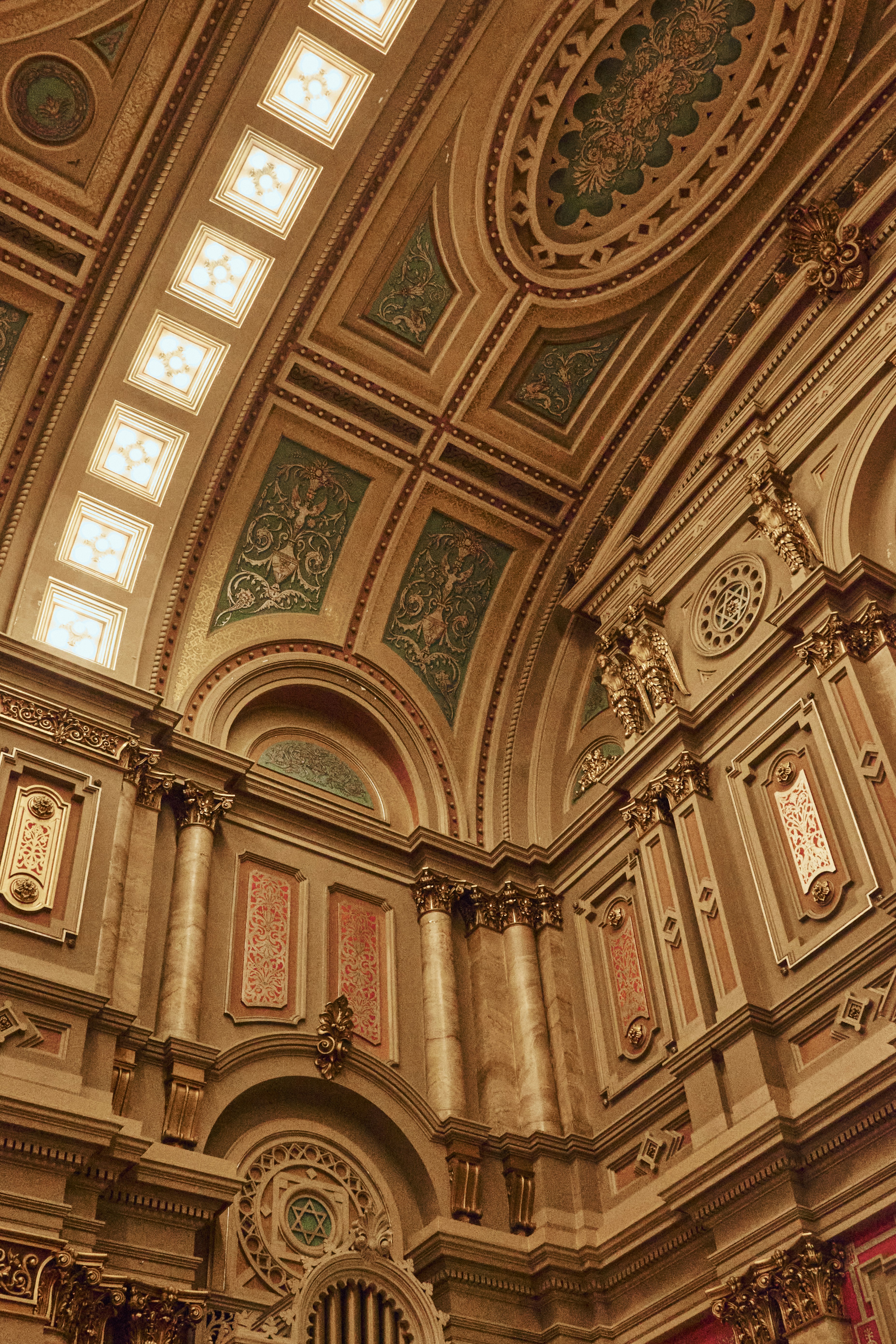 Ornate Vaults: A Sanctum of Arches and Green Panels
