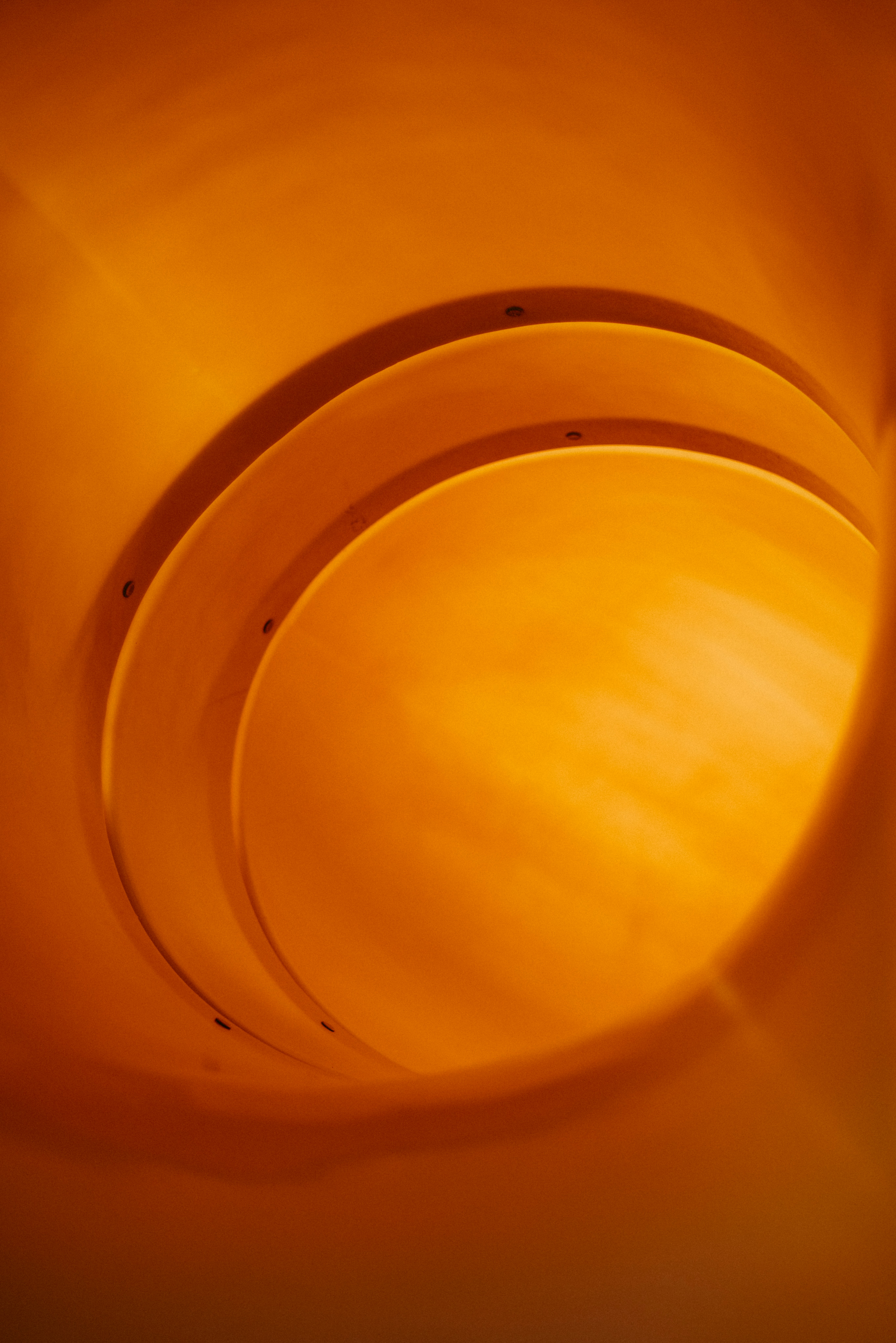 Vortex of Light: An Abstract Spiral in Warm Amber