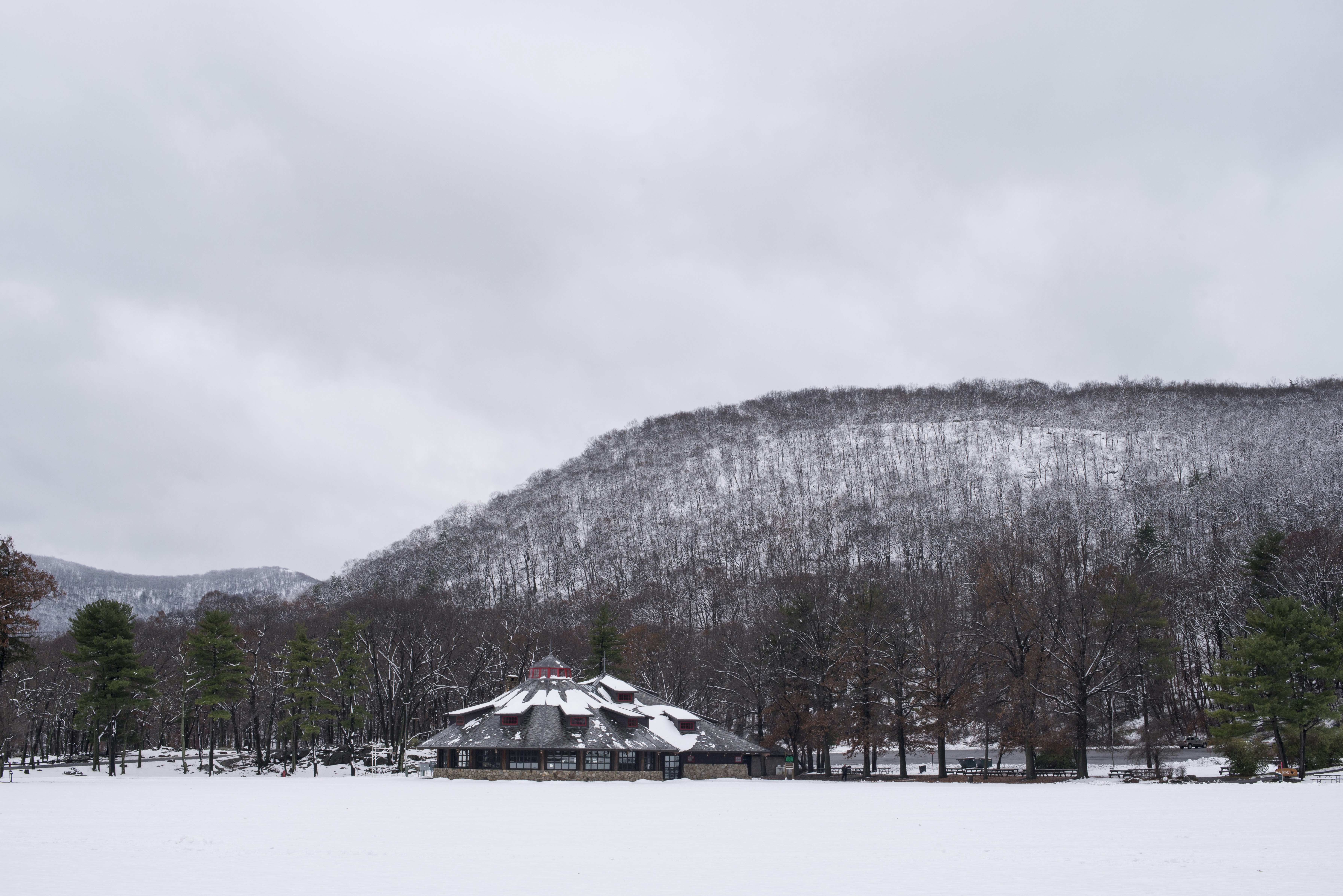 Snowbound Lodge Nestled at the Foot of a Frosted Ridge