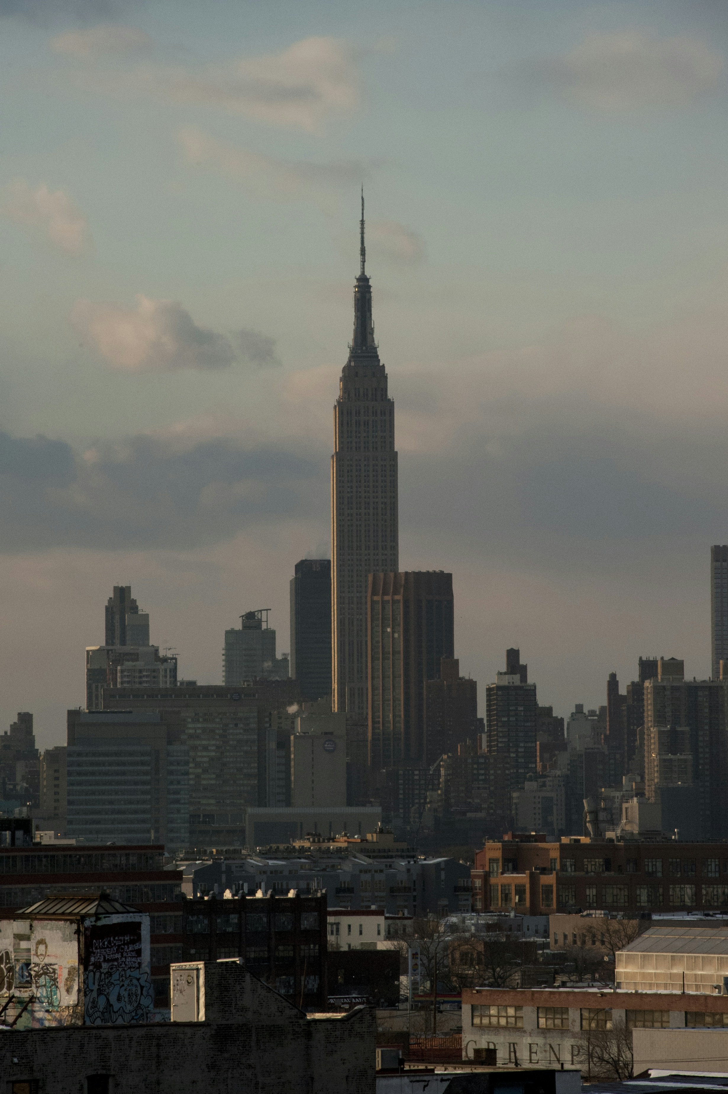 Empire in Focus: A Sunset Silhouette Over Midtown
