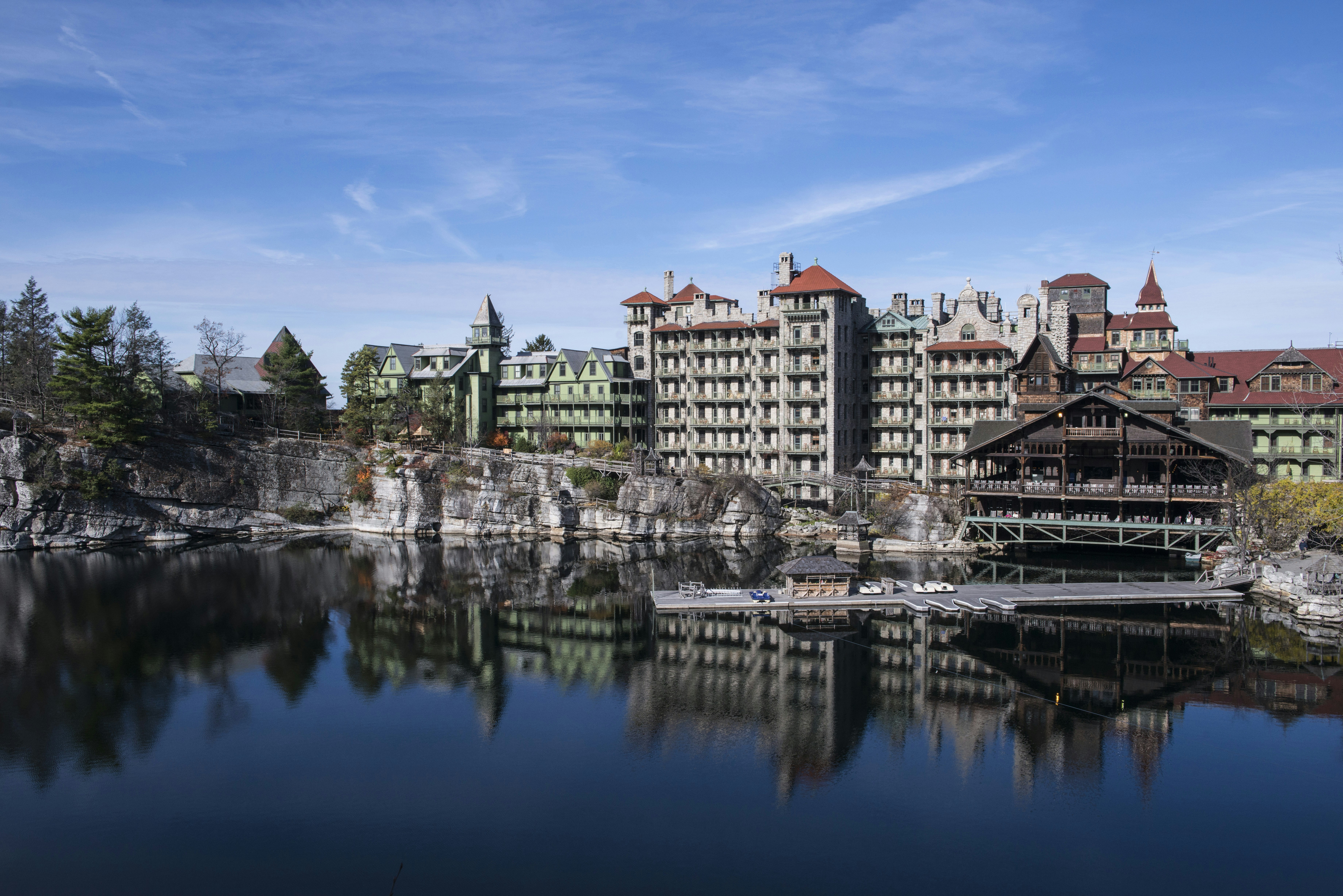 Castle-like Waterfront Complex Reflected in Serene Lake