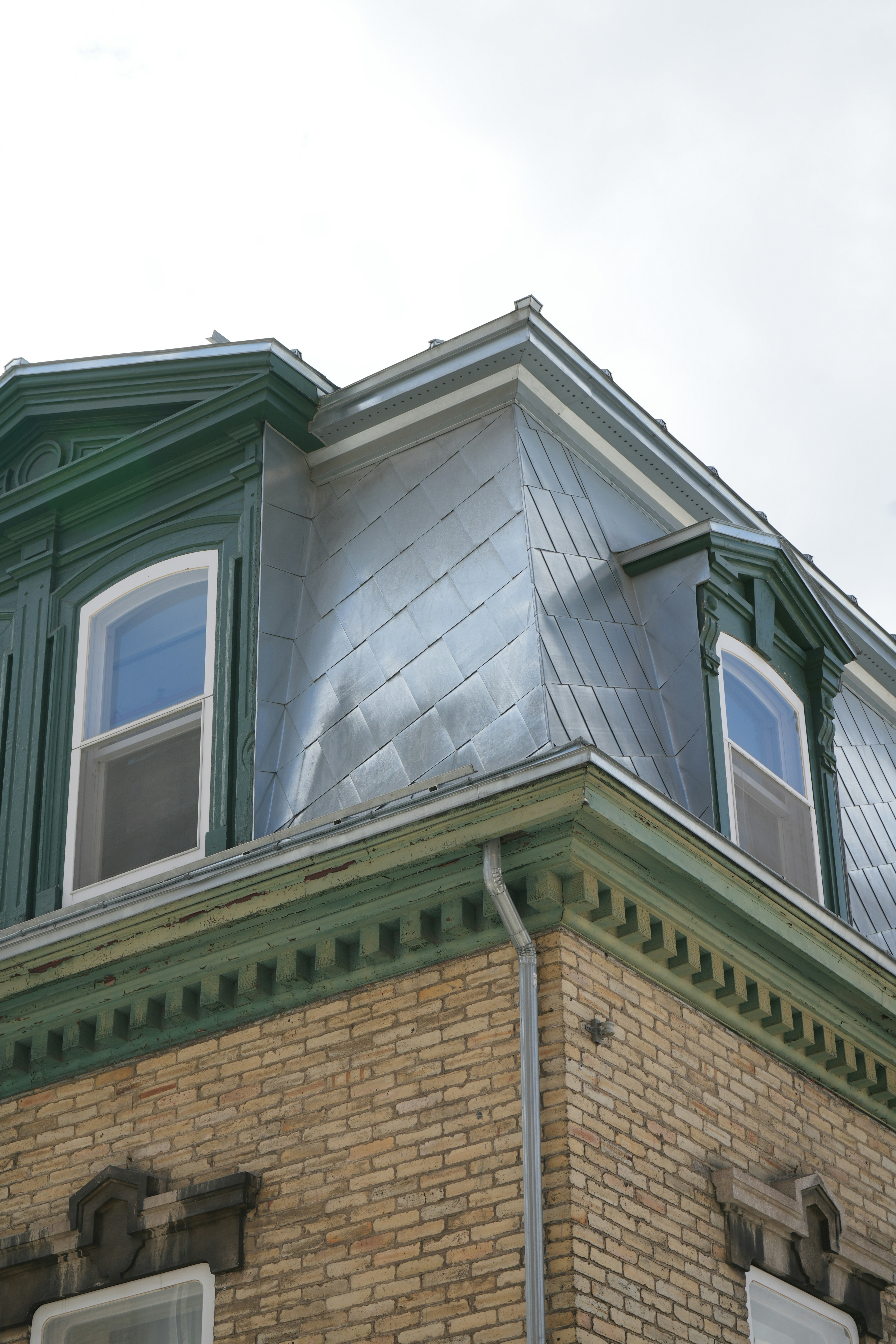 Corner of Green-Trimmed Victorian Rooftop