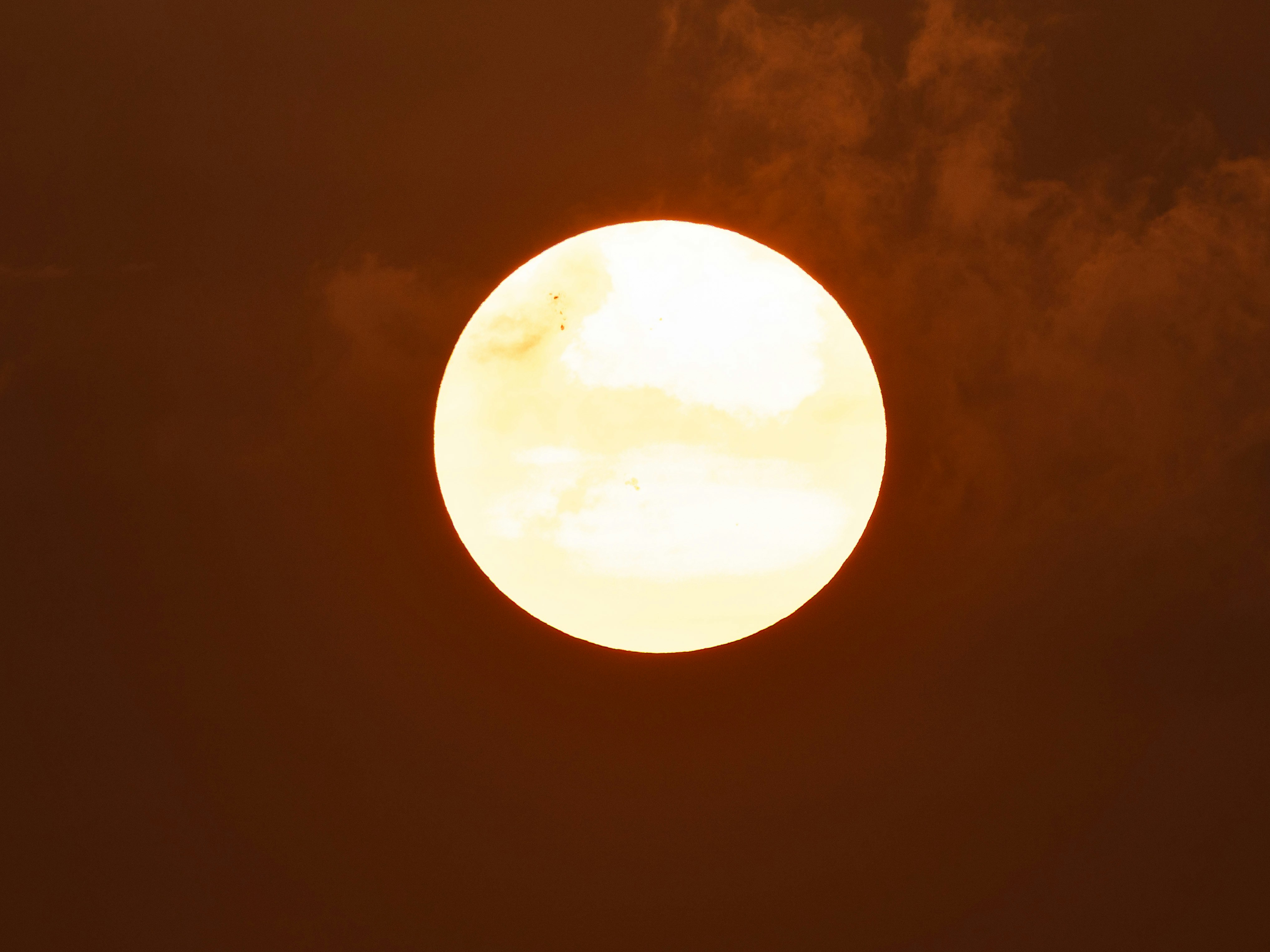 Sun Disk on a Copper Sky: A Minimalist Evening