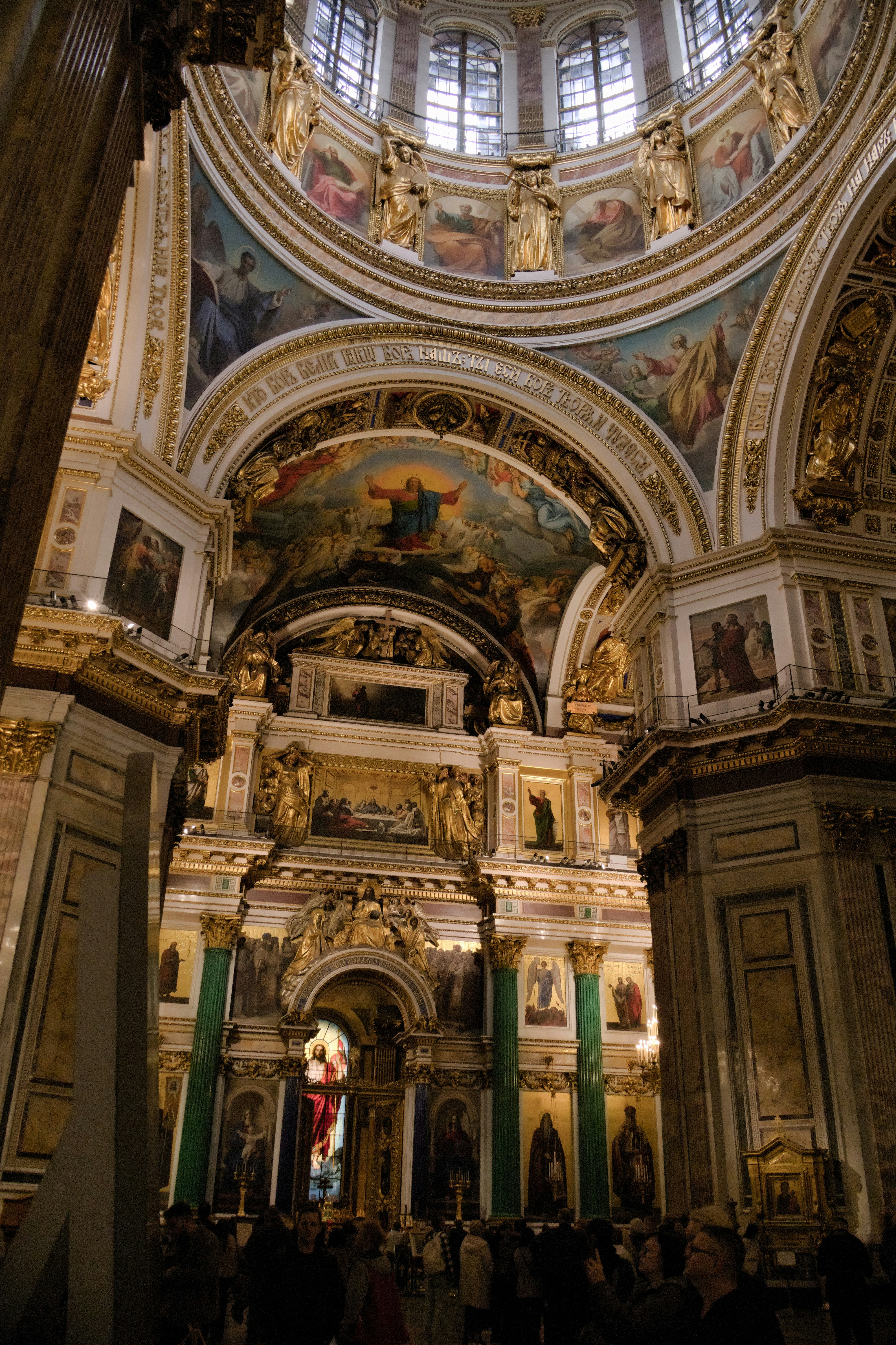 Ornate Cathedral Interior: Gold-leafed Arcades and Painted Domes Framing a Grand Altarpiece