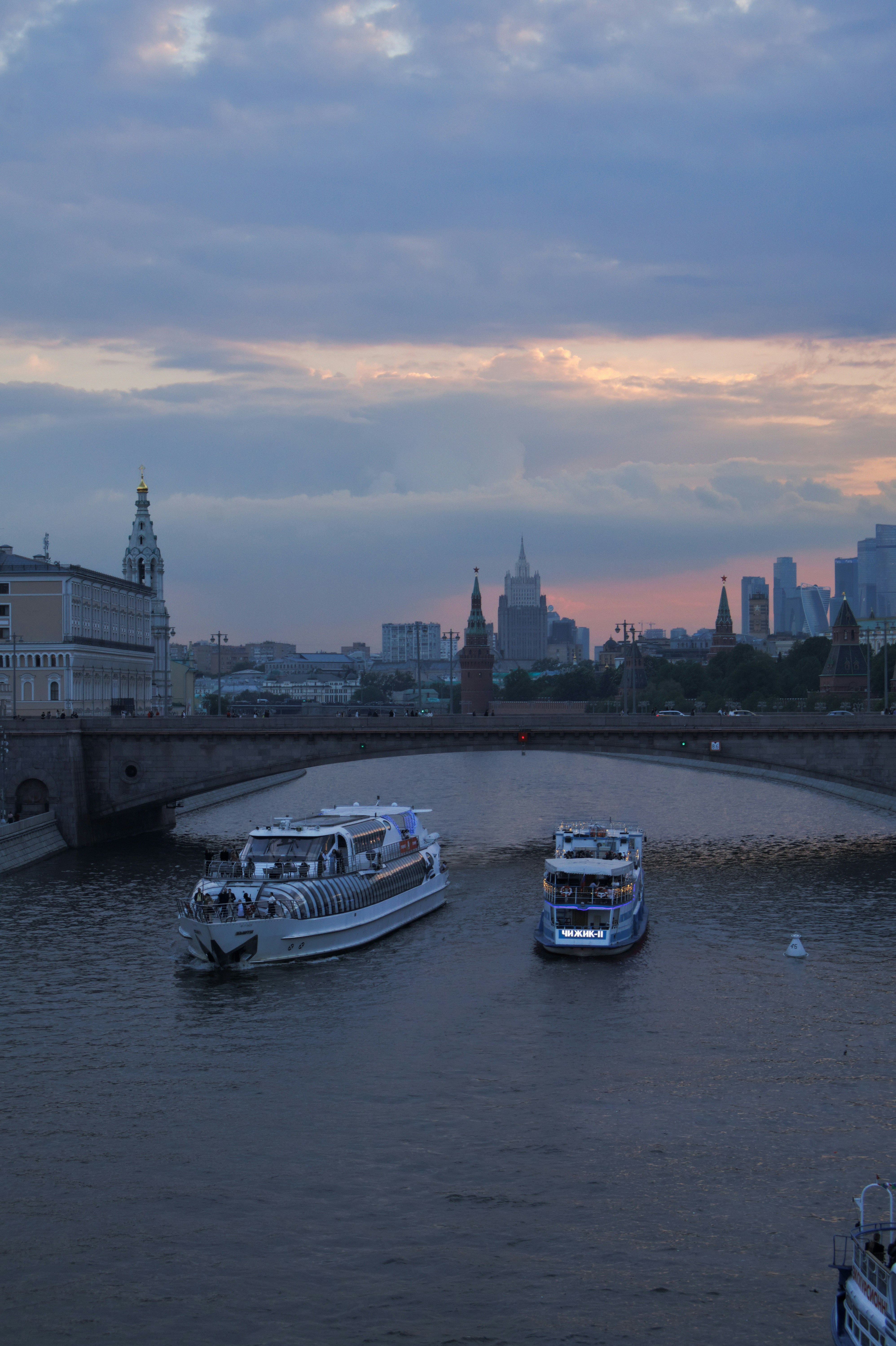 City of Bridges at Dusk: Boats on the Moskva Corridor