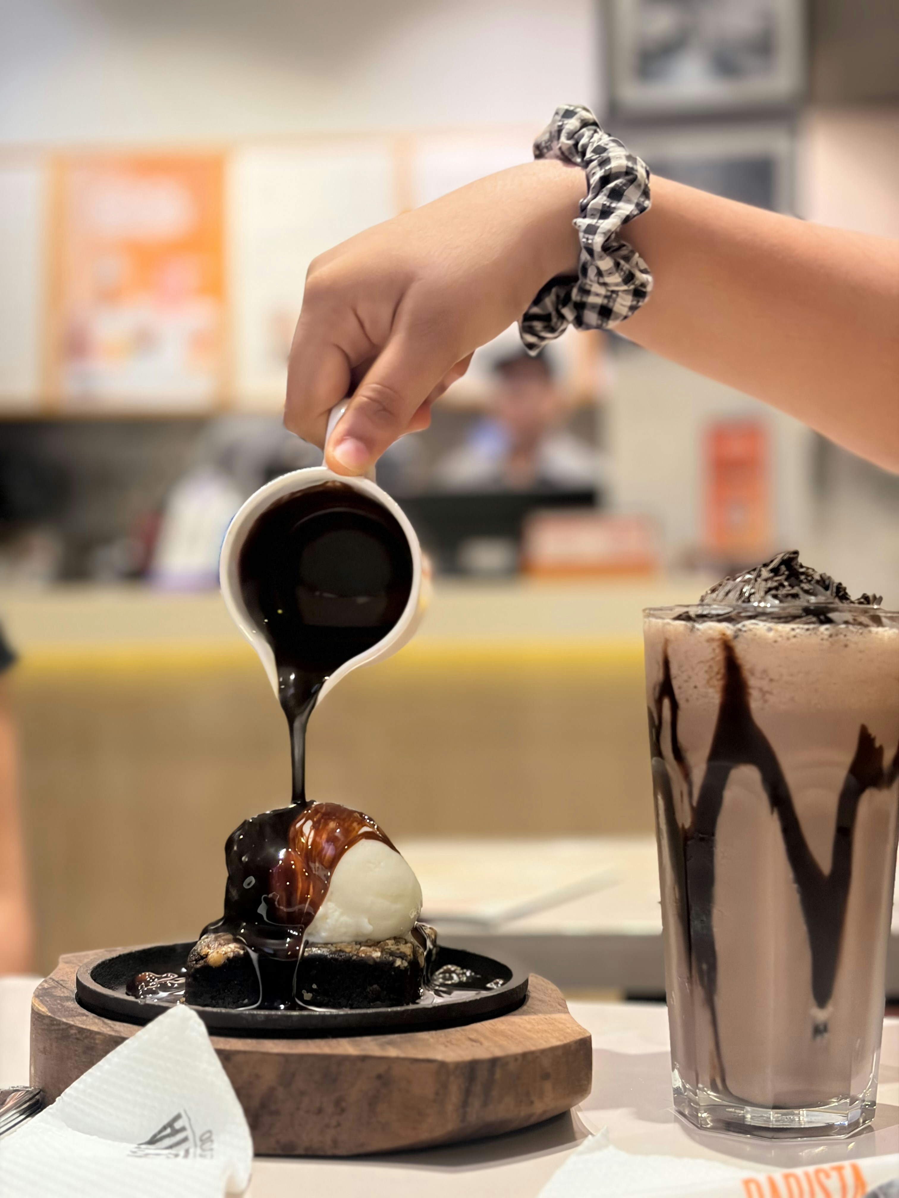 Dark Chocolate Drizzle: A Sweet Pour Over a Tiny Pearl Dessert