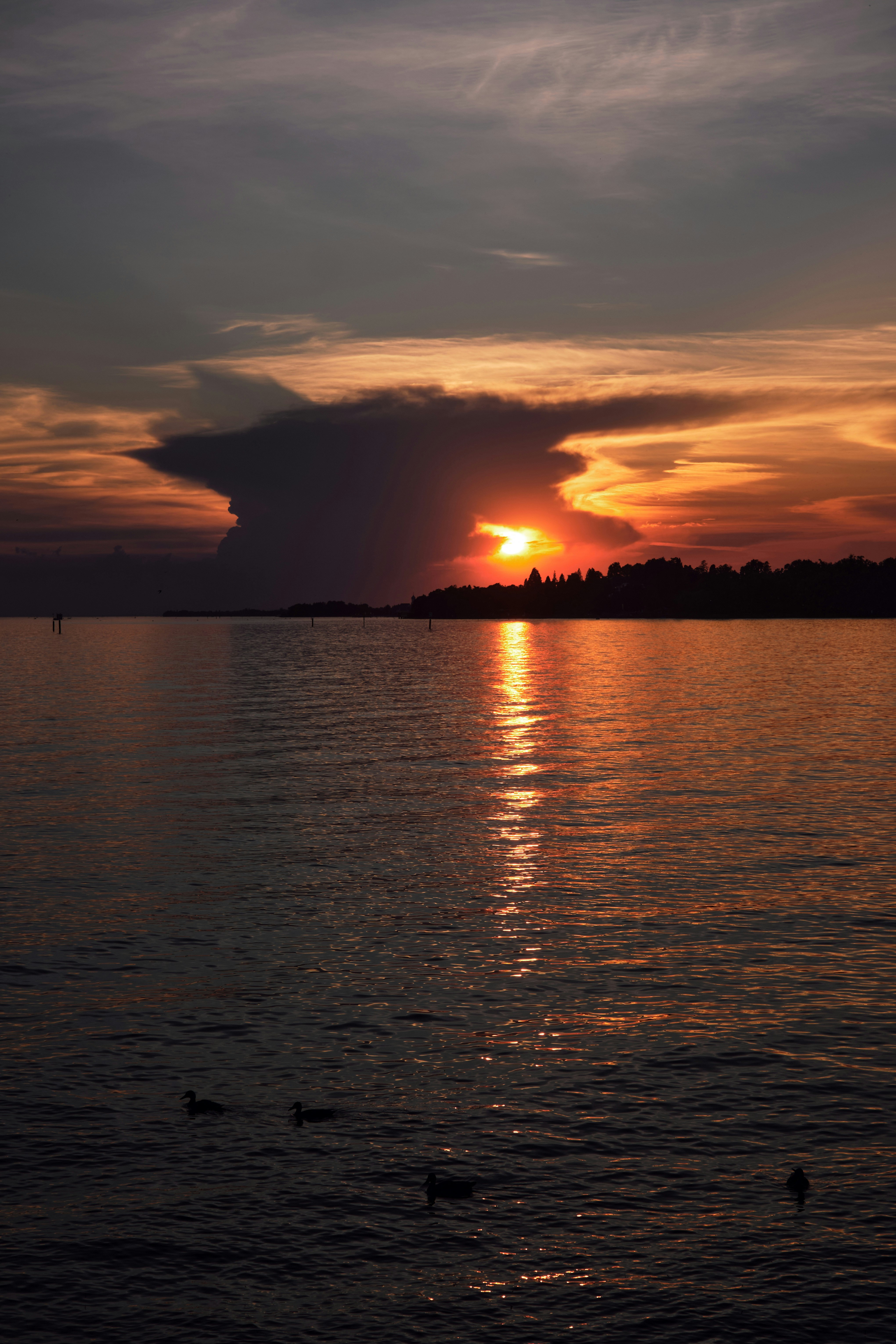 Sunset Convergence: A Quiet Horizon Over Quiet Waters
