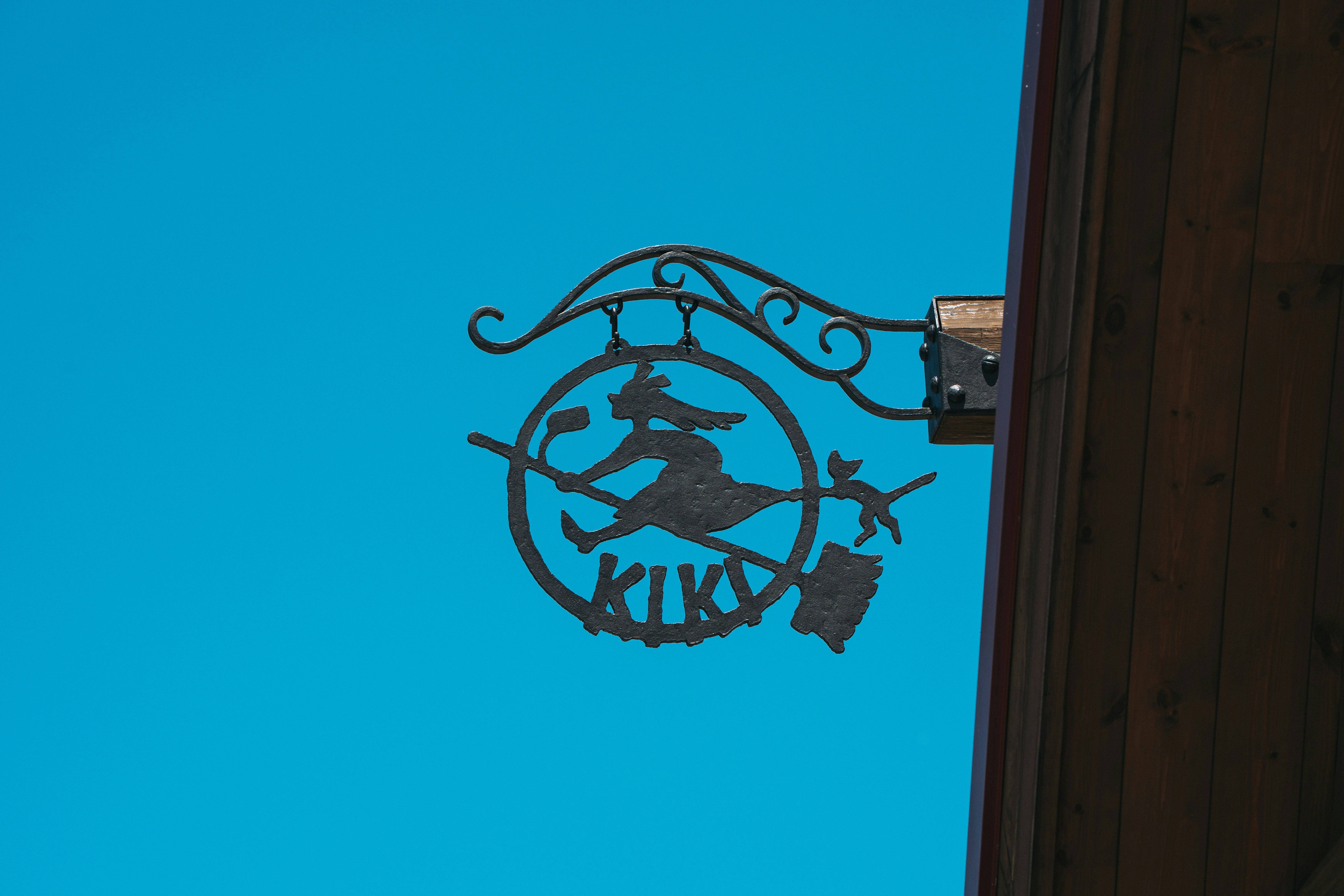 Witch’s Banner: Aerial Signage Against a Clear Blue Sky