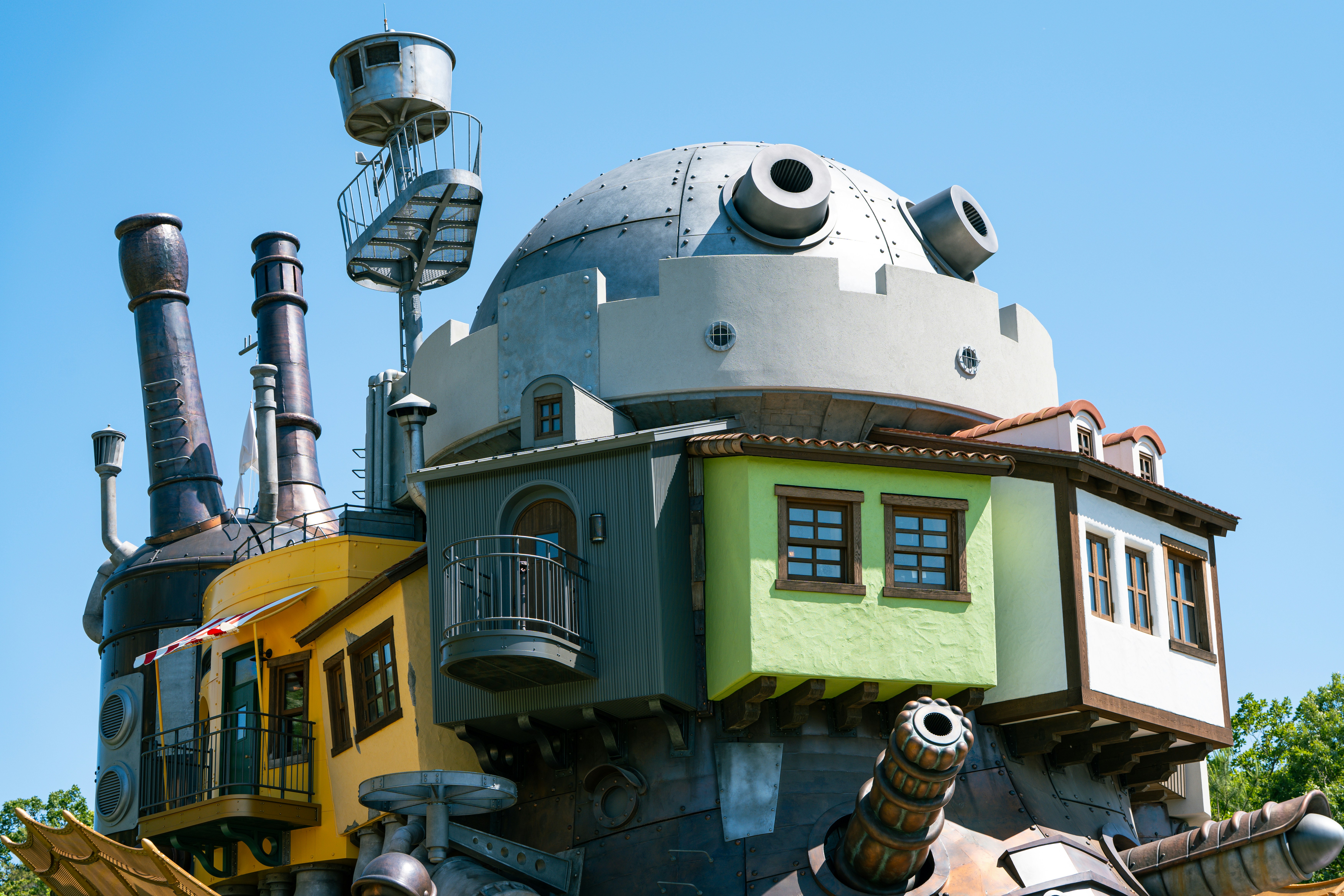 Whimsical Turreted Studio on a Mechanical Mountain