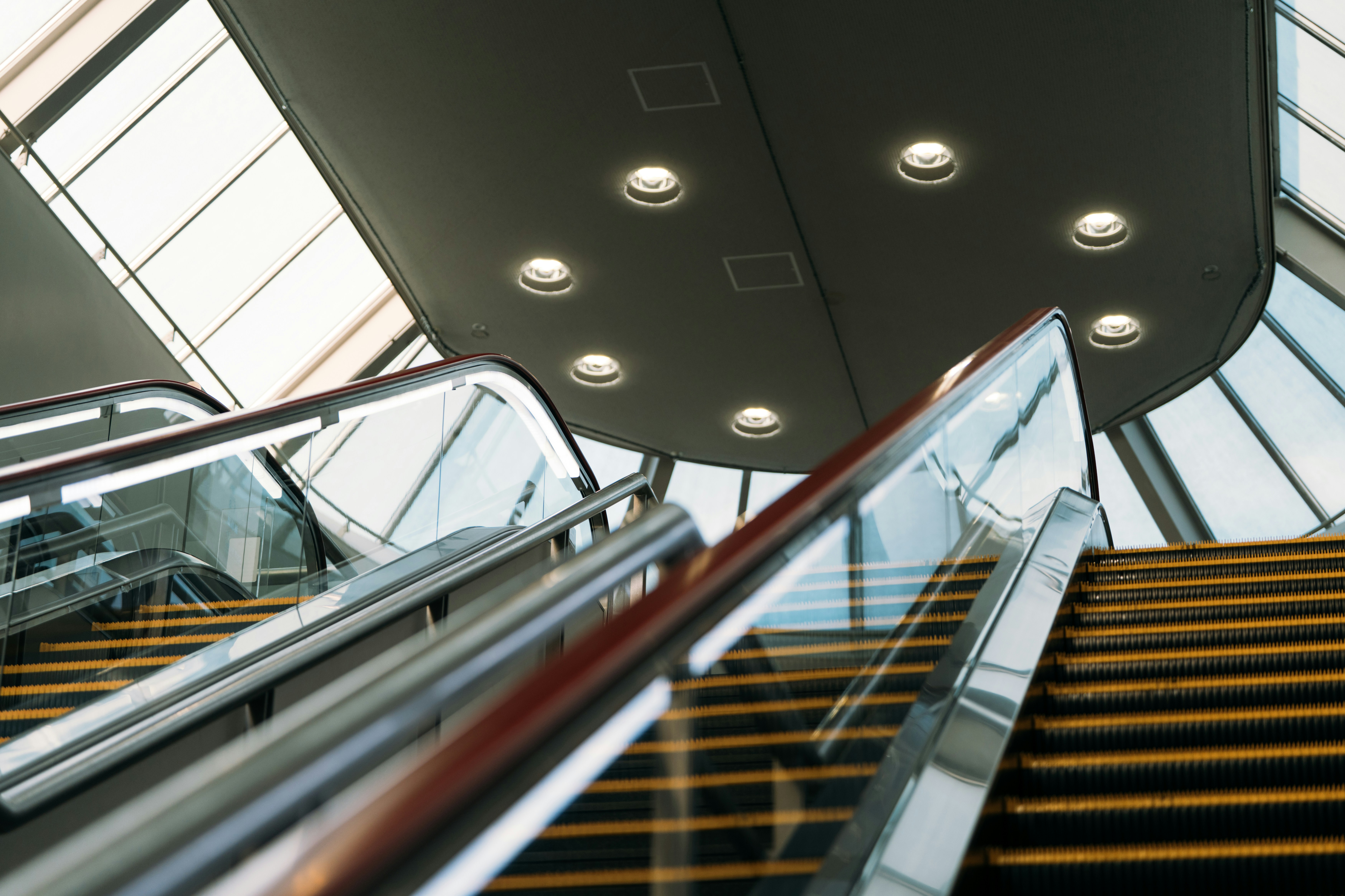 Gliding Up an Atrium: Glass, Steel and Light on an Escalator