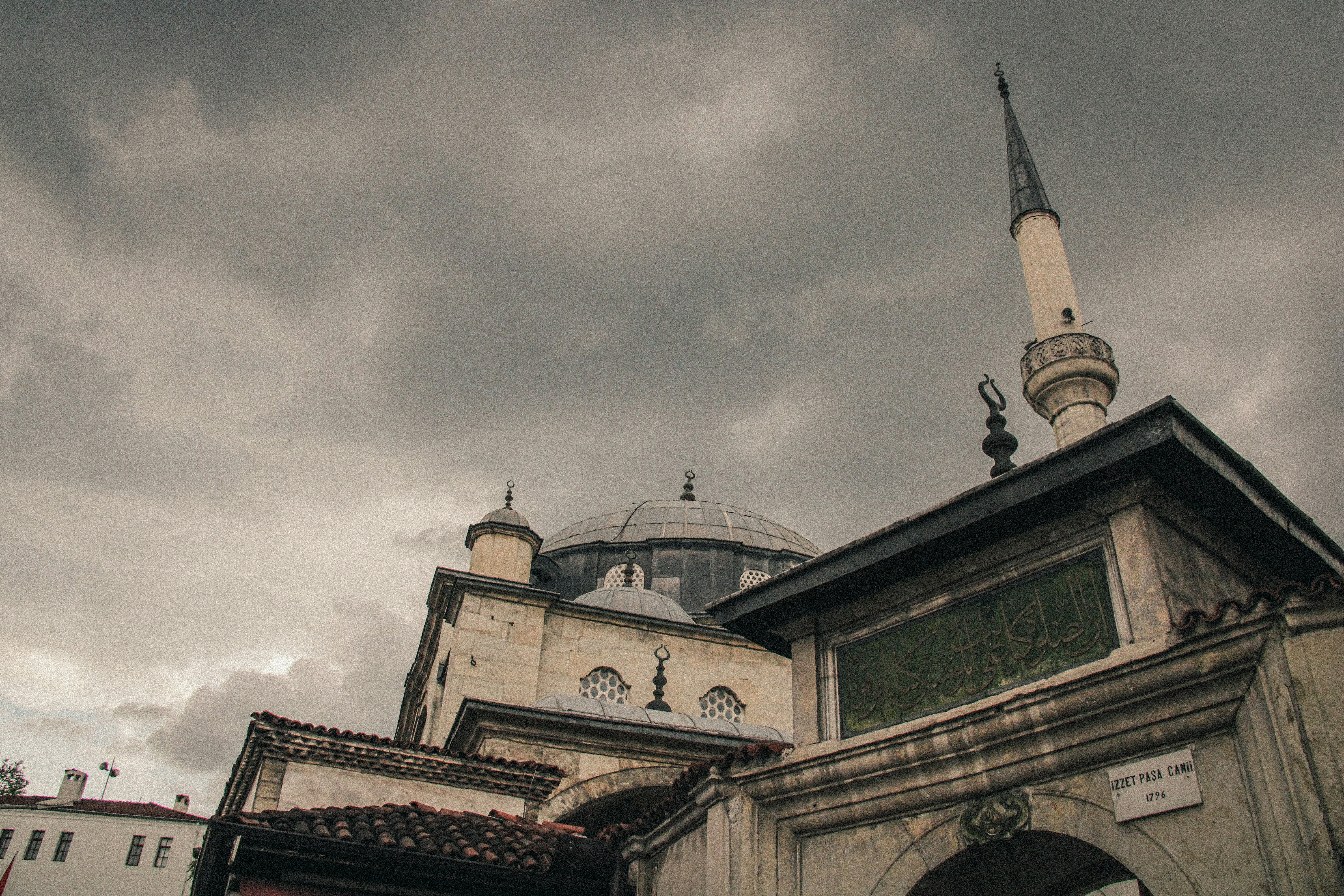 Mosque Silhouette Under Stormy Sky