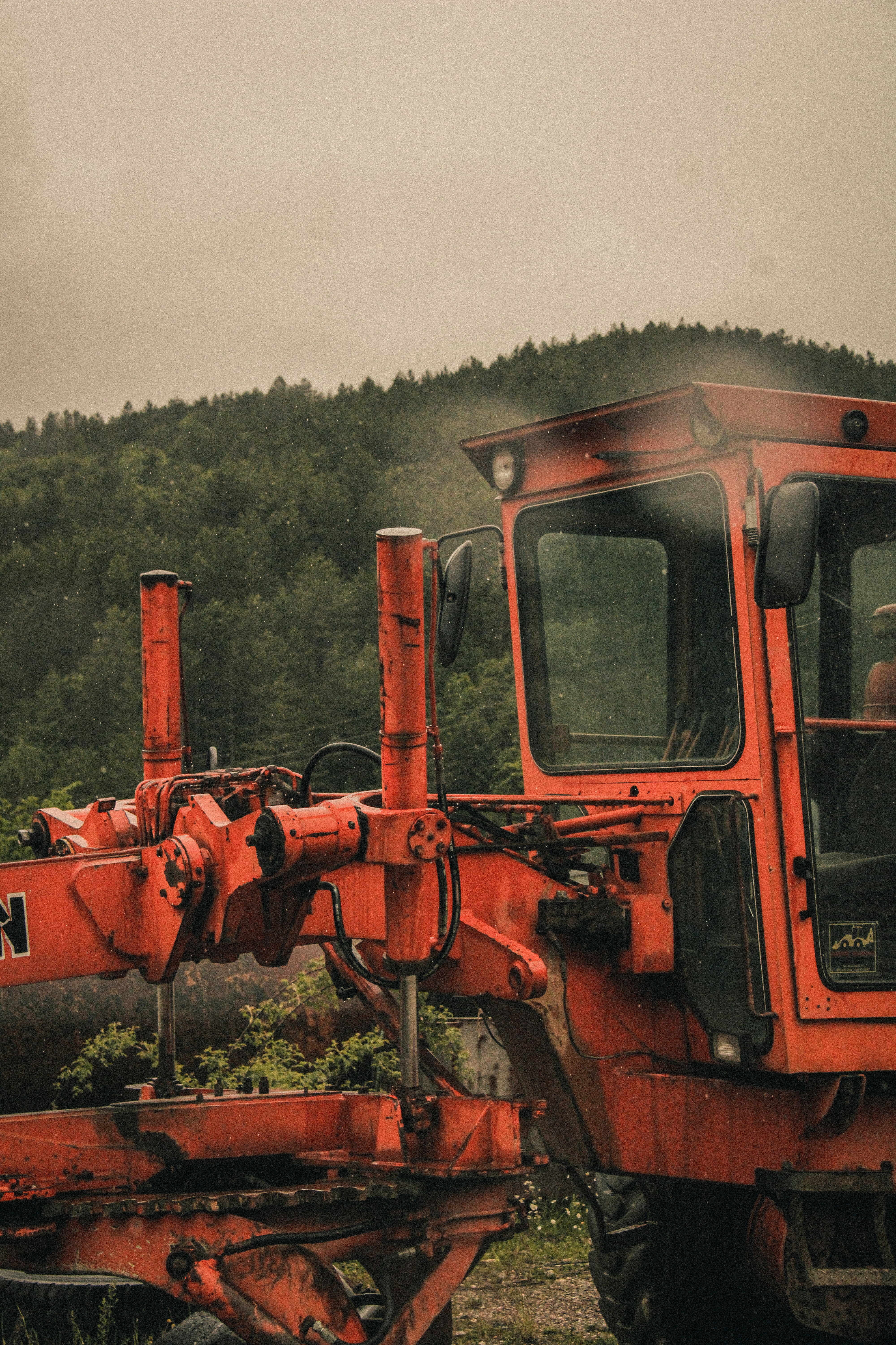 Rusted Crane in Red: A Close-Up of Industrial Grit