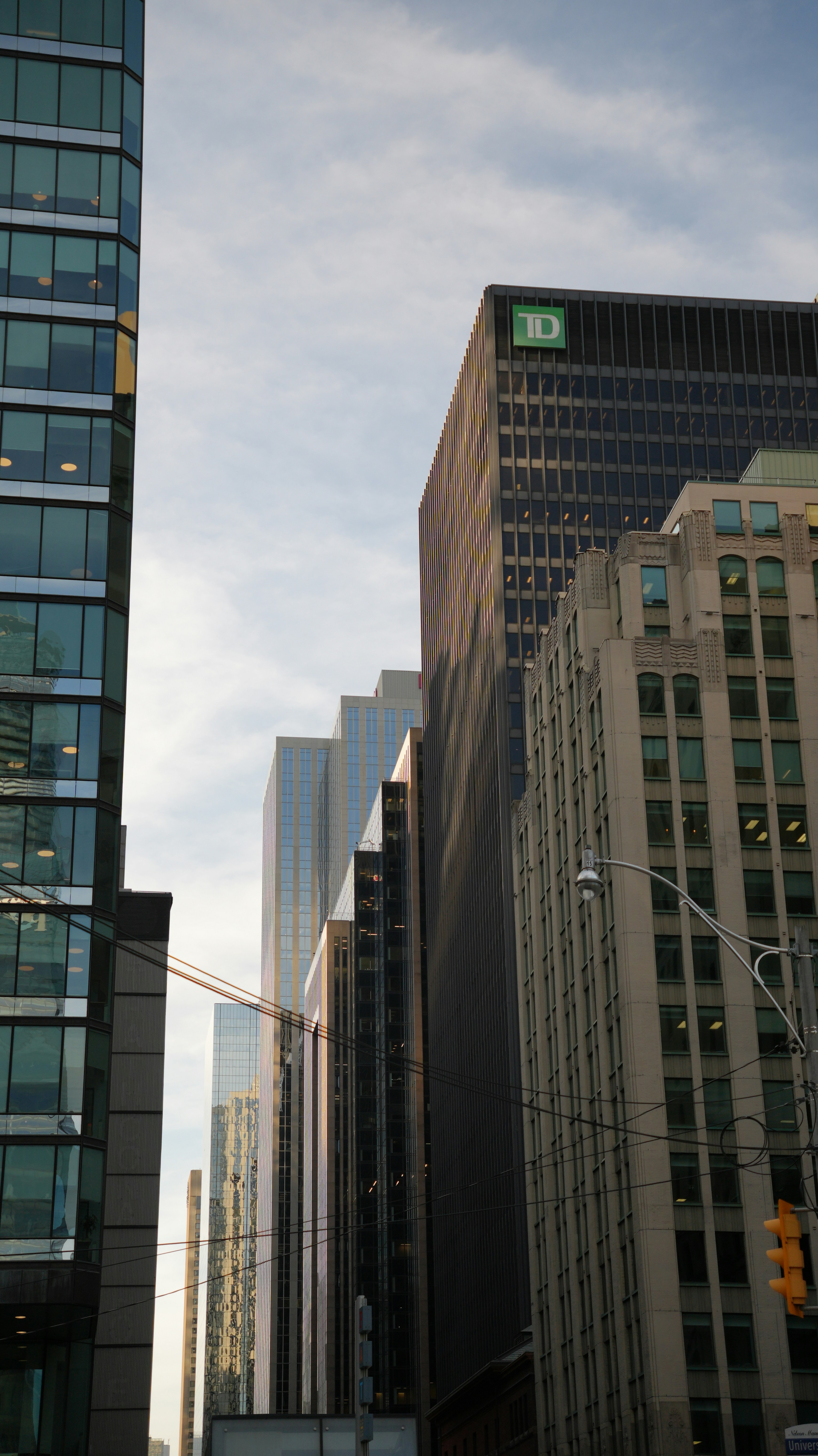Skyscraper Alley: Evening Light Between Glass and Concrete