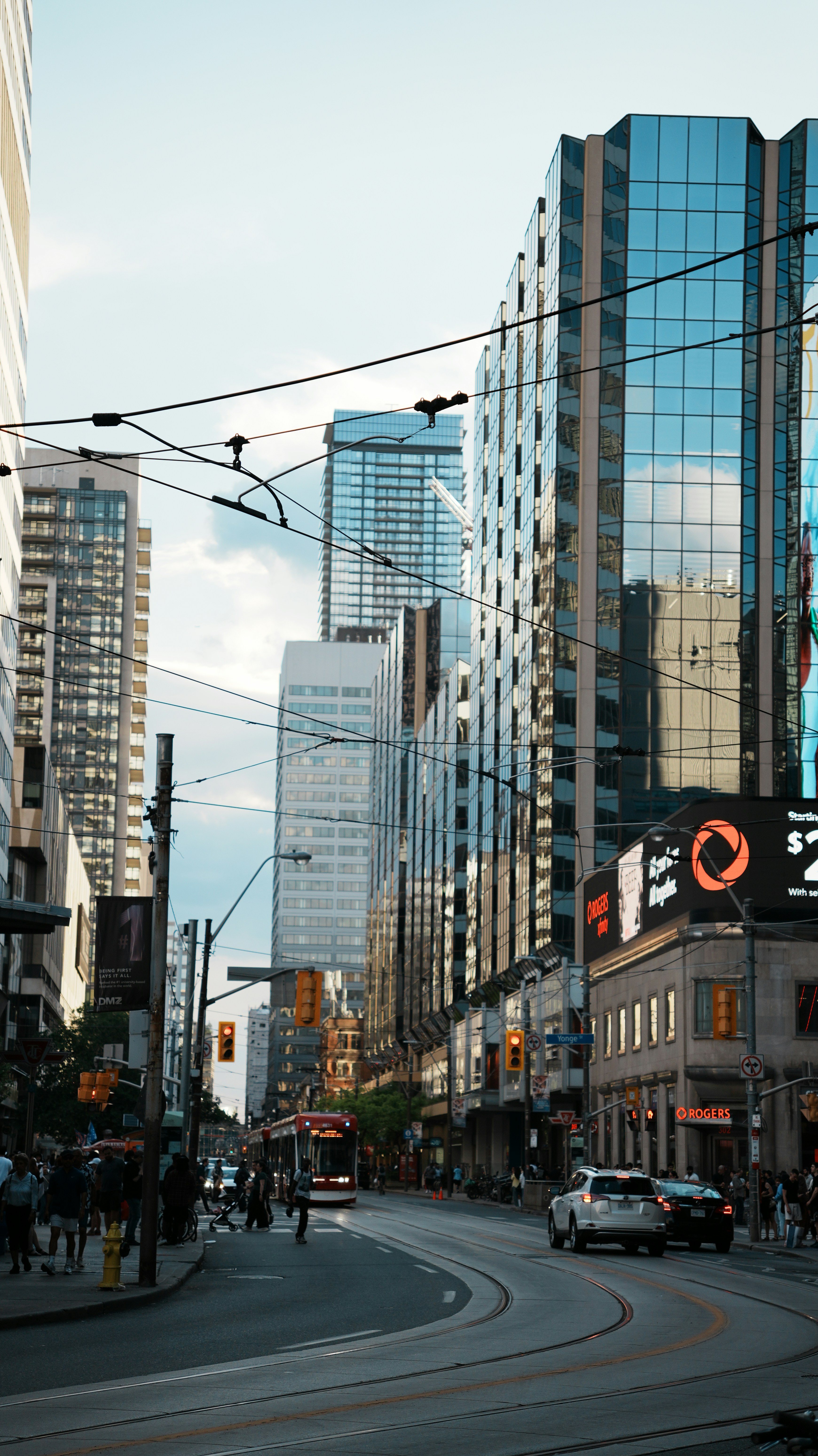 City Pulse: Glass and Gears on a Sunlit Street