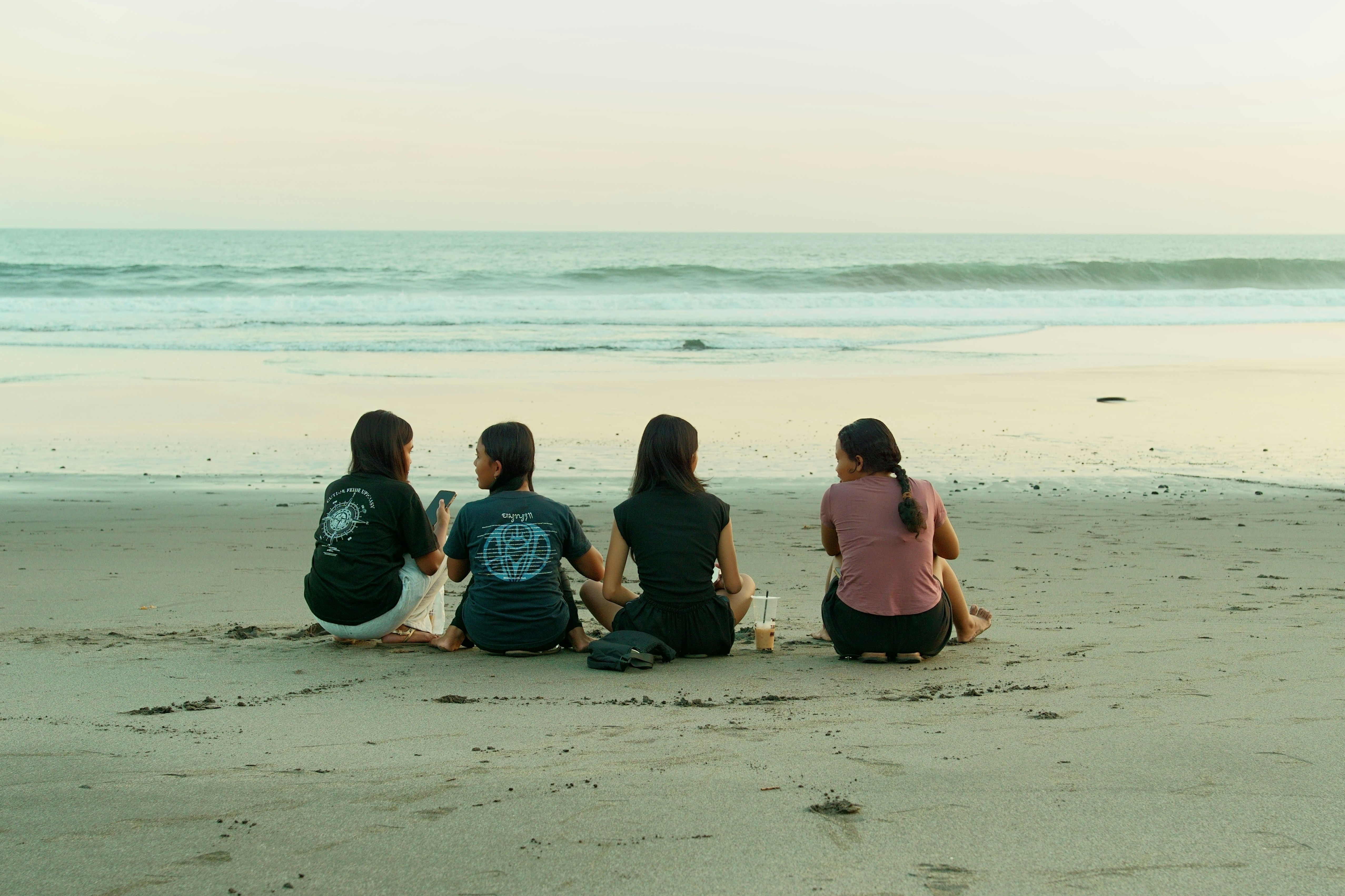 Four Companions on a Quiet Seashore