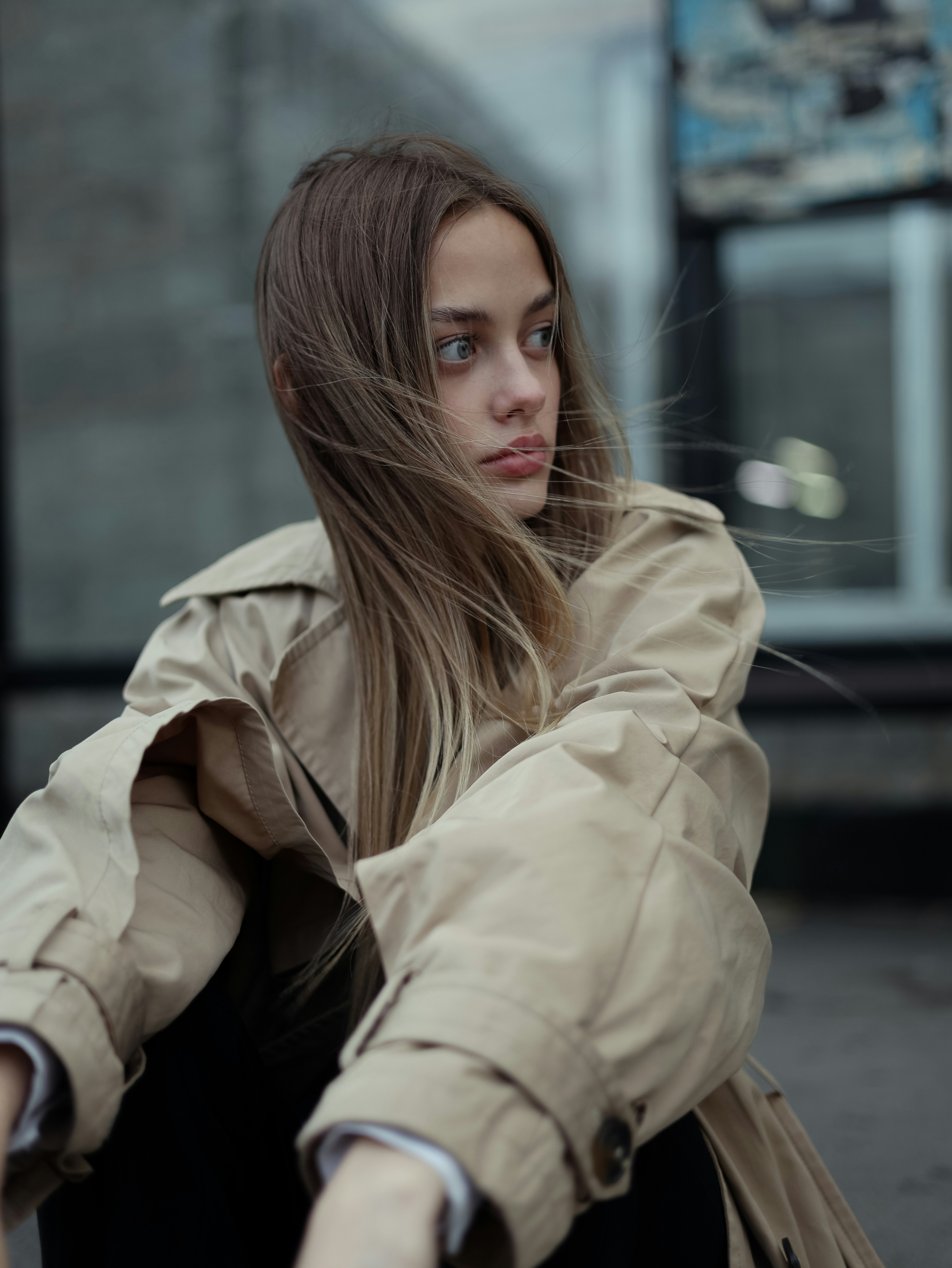Portrait in Wind: A Moment of Quiet on a City Bench