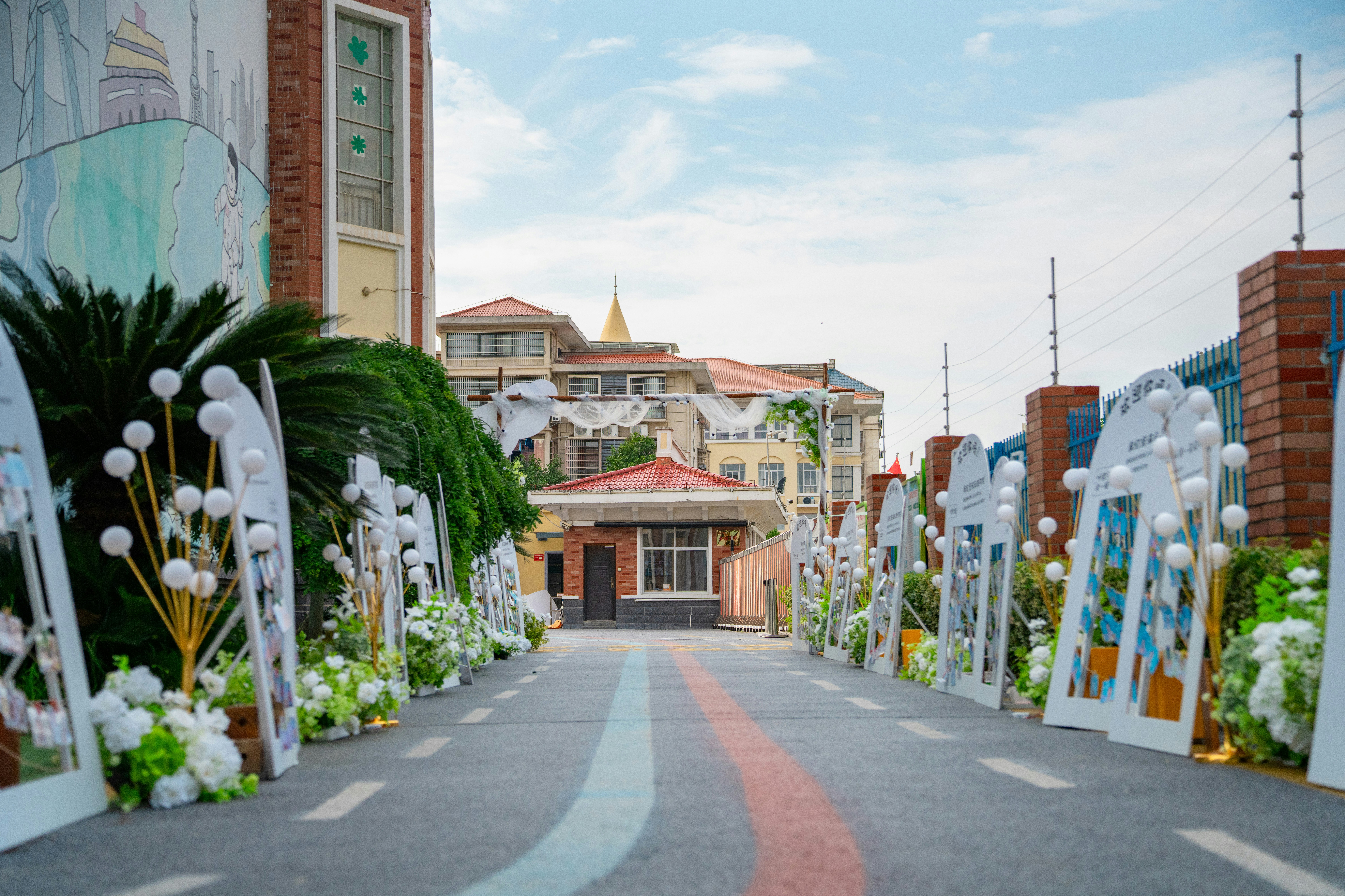 A Corridor of Lighted Alleys: Decorative Panels Framing a Quiet Street