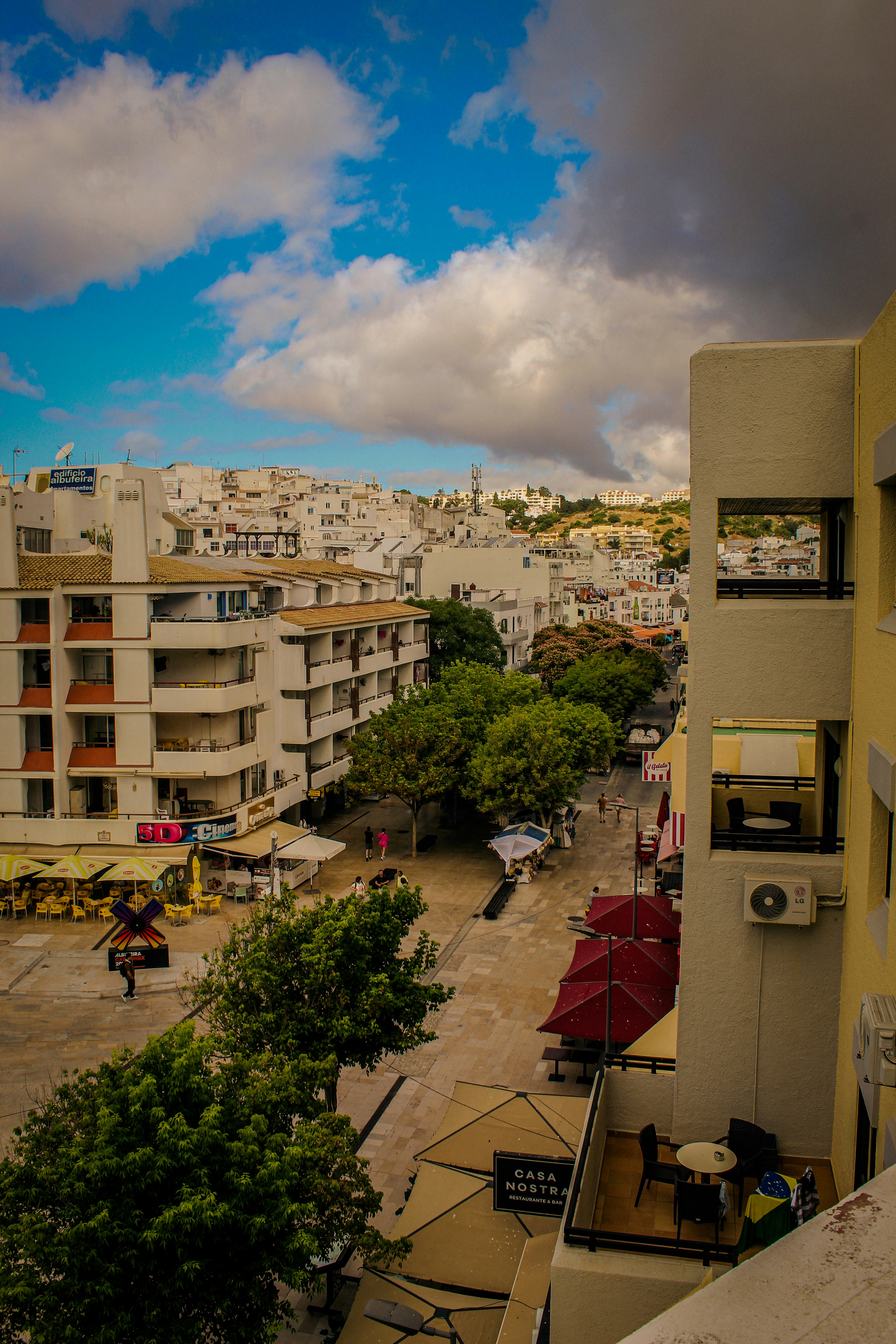 Balcony View Over a Mediterranean Town Square