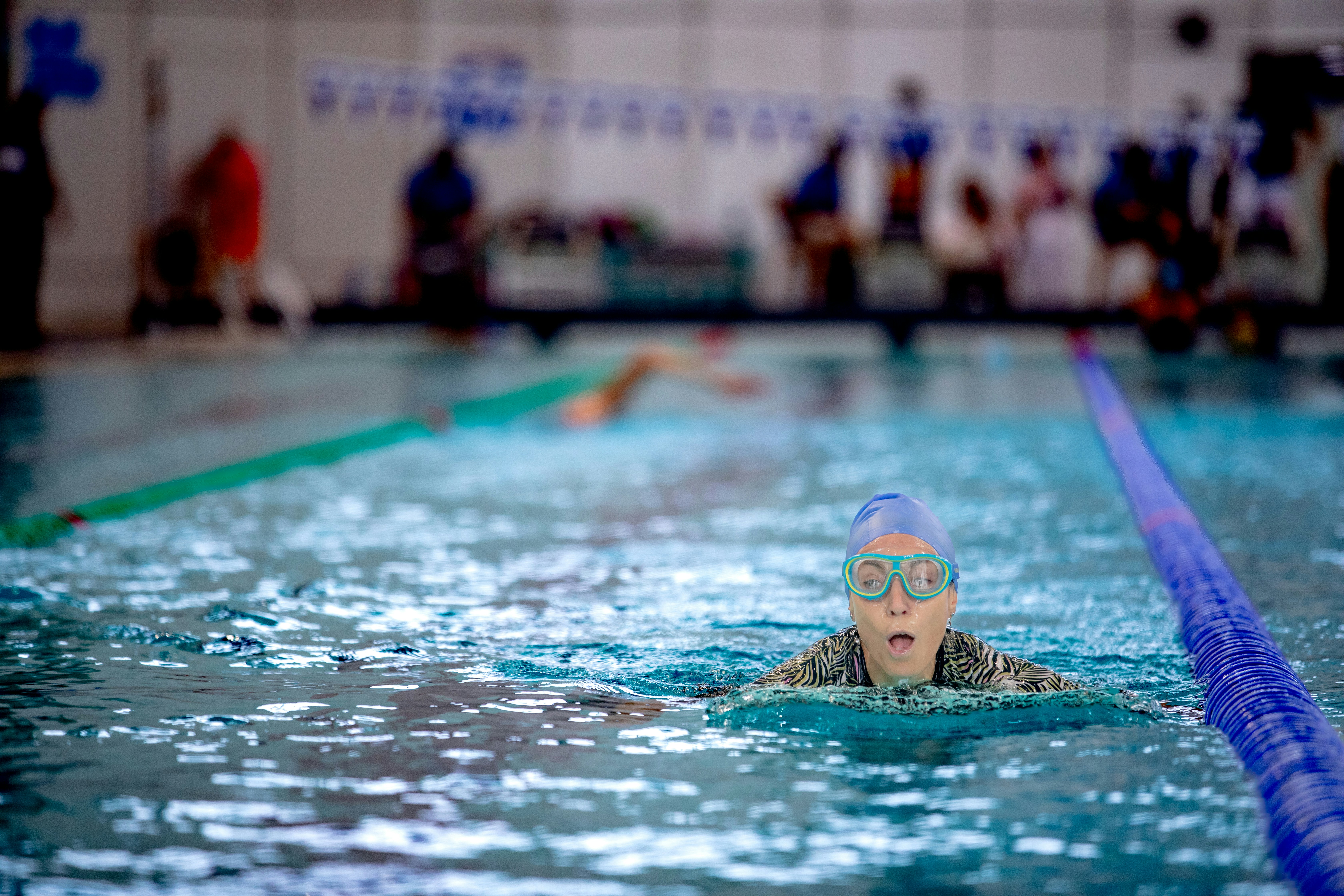Center Lane: Focused Gaze of a Competitive Swimmer