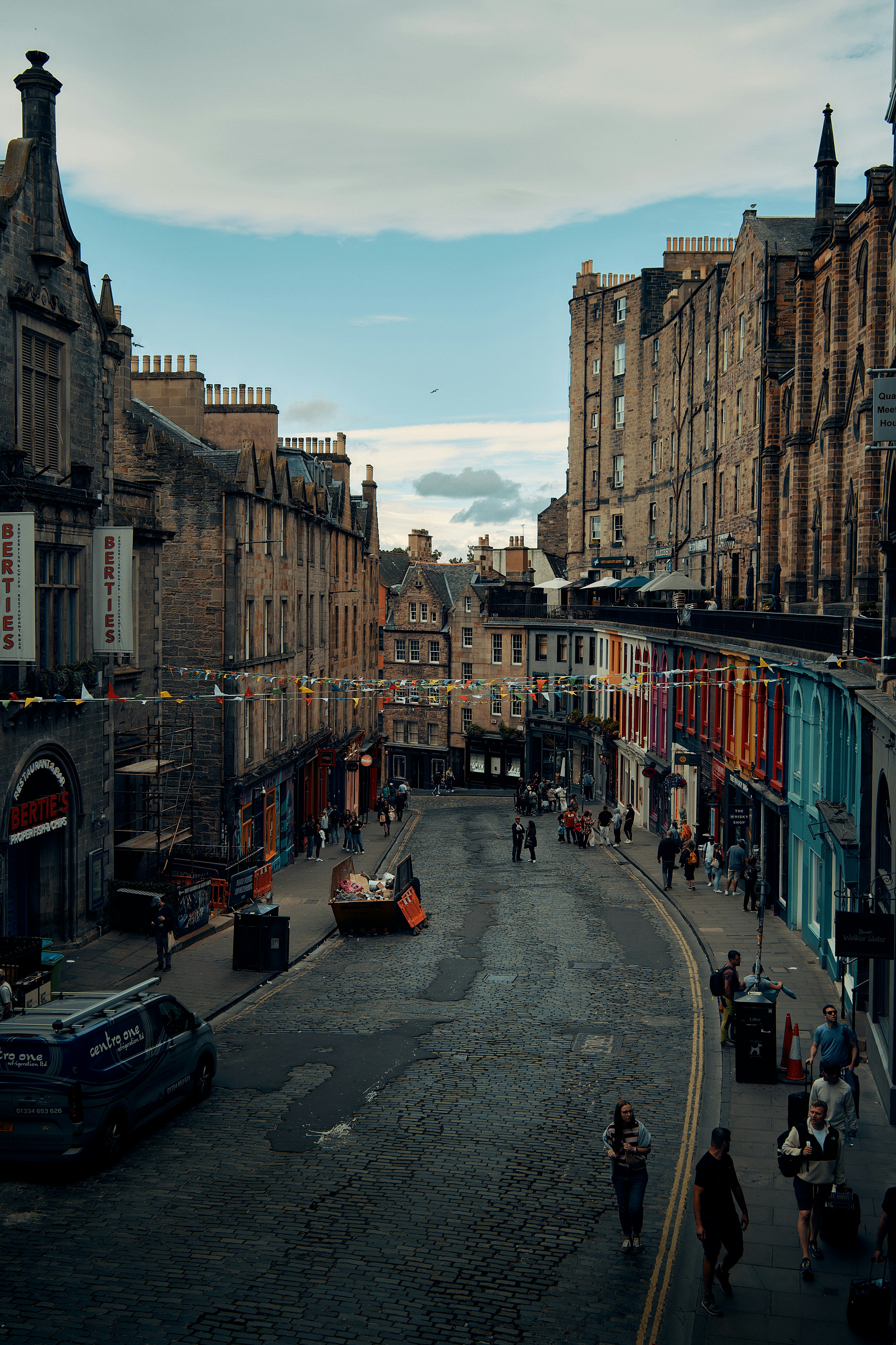 Cobbled Street Arcade: A Burst of Color Beneath the Skyline