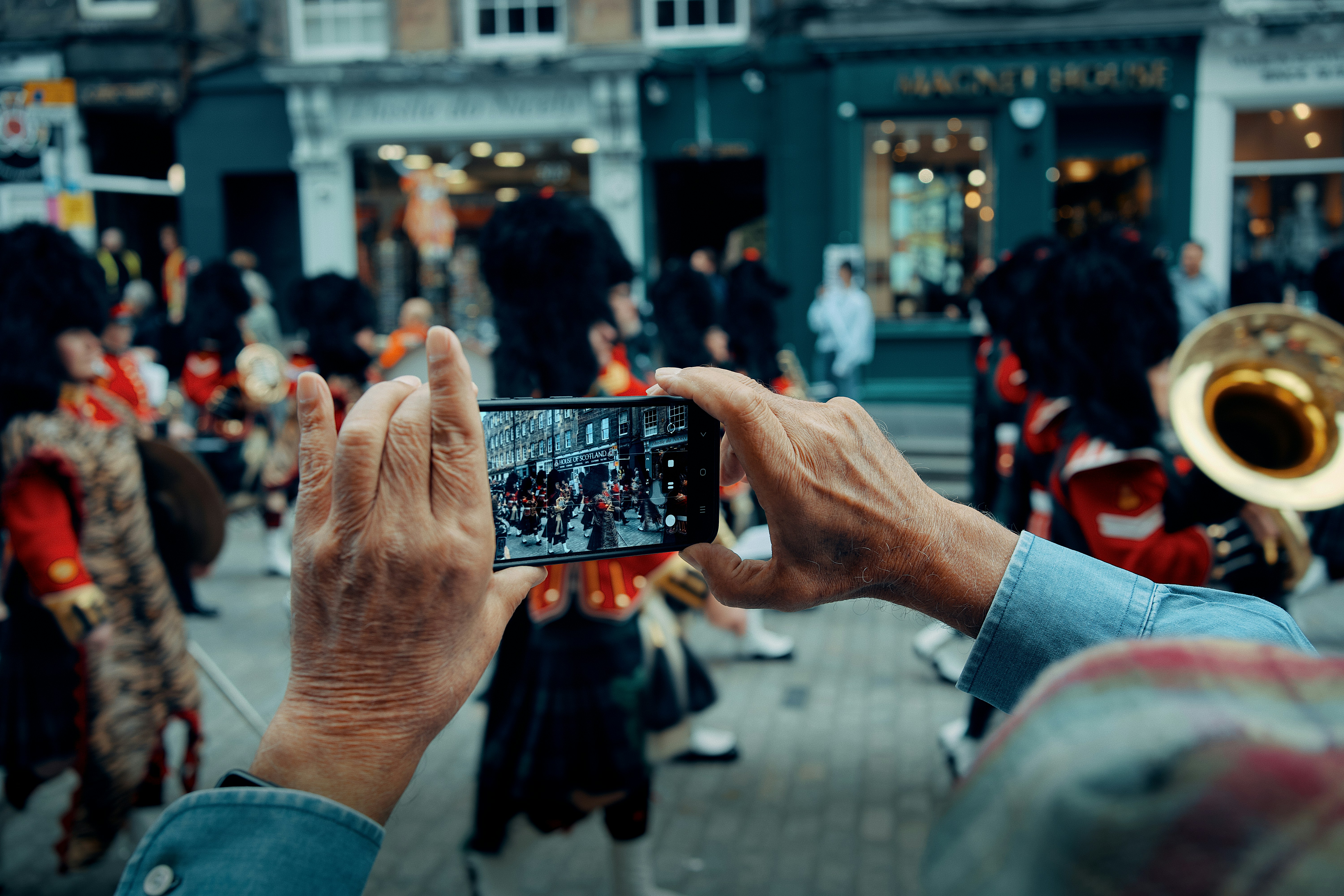 Phone Tap: A Street Parade Captured in Motion