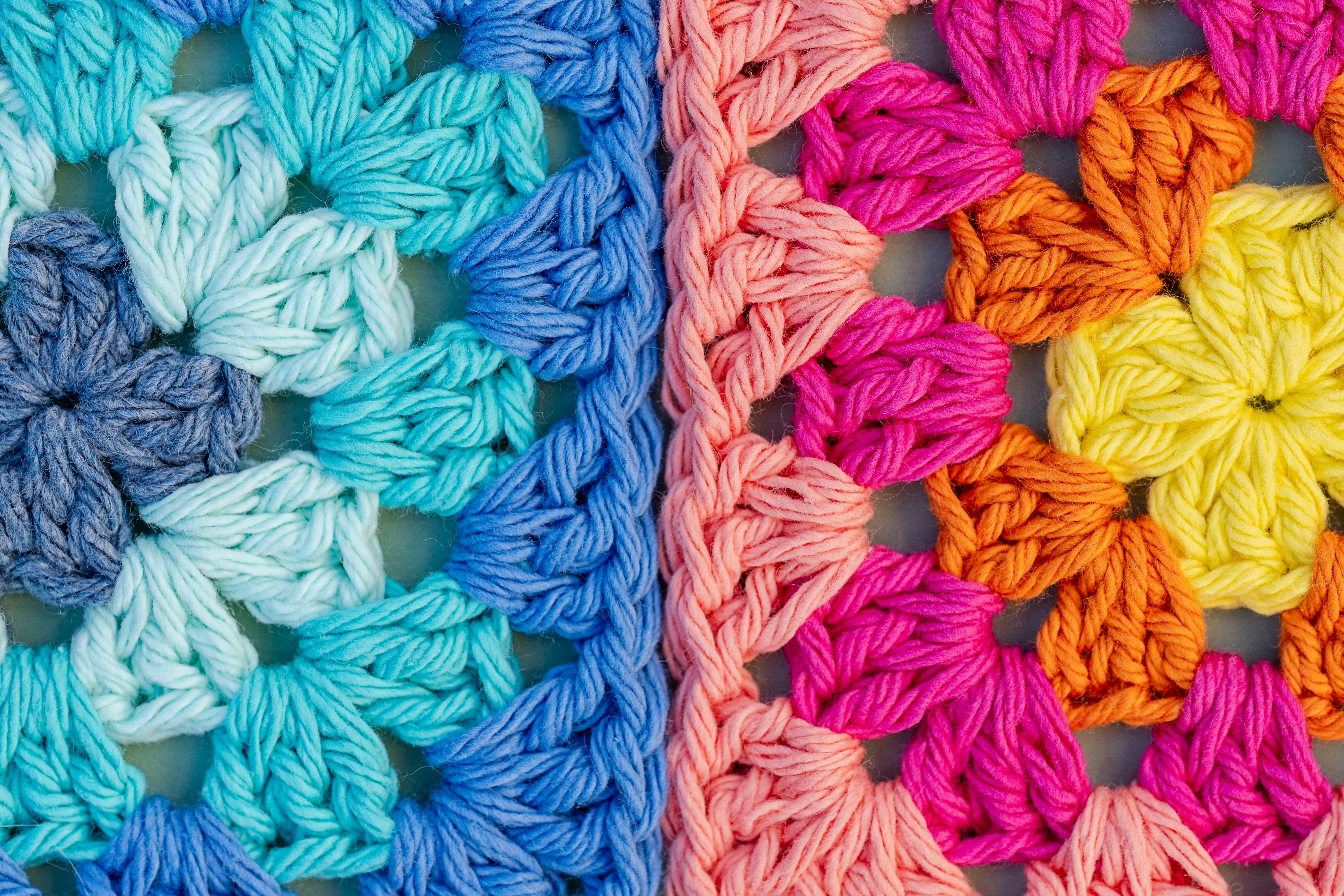 Colorful Crochet Kaleidoscope: A Close-Up of Interwoven Petal Motifs