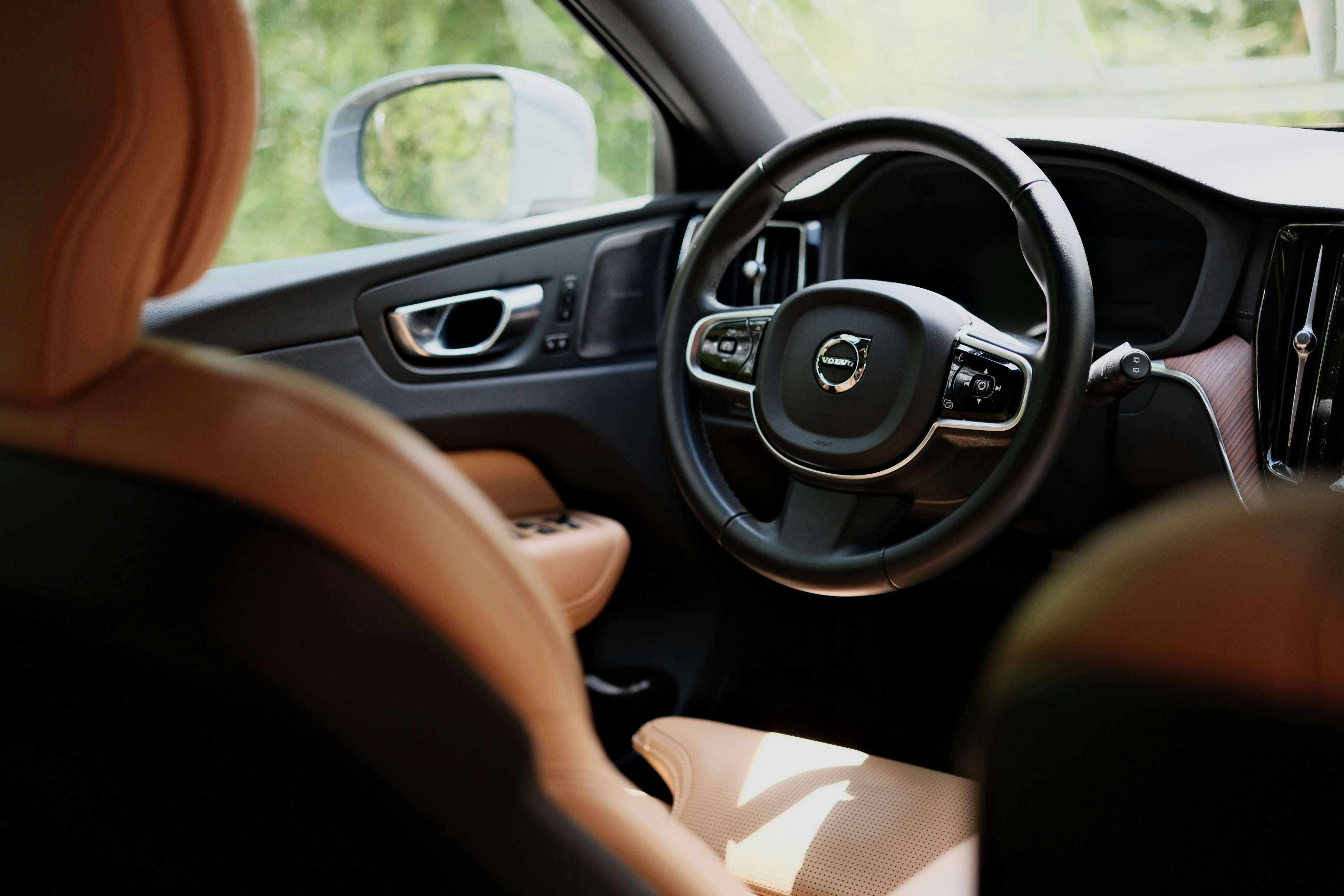 Lux interior: golden tones and steering wheel calm