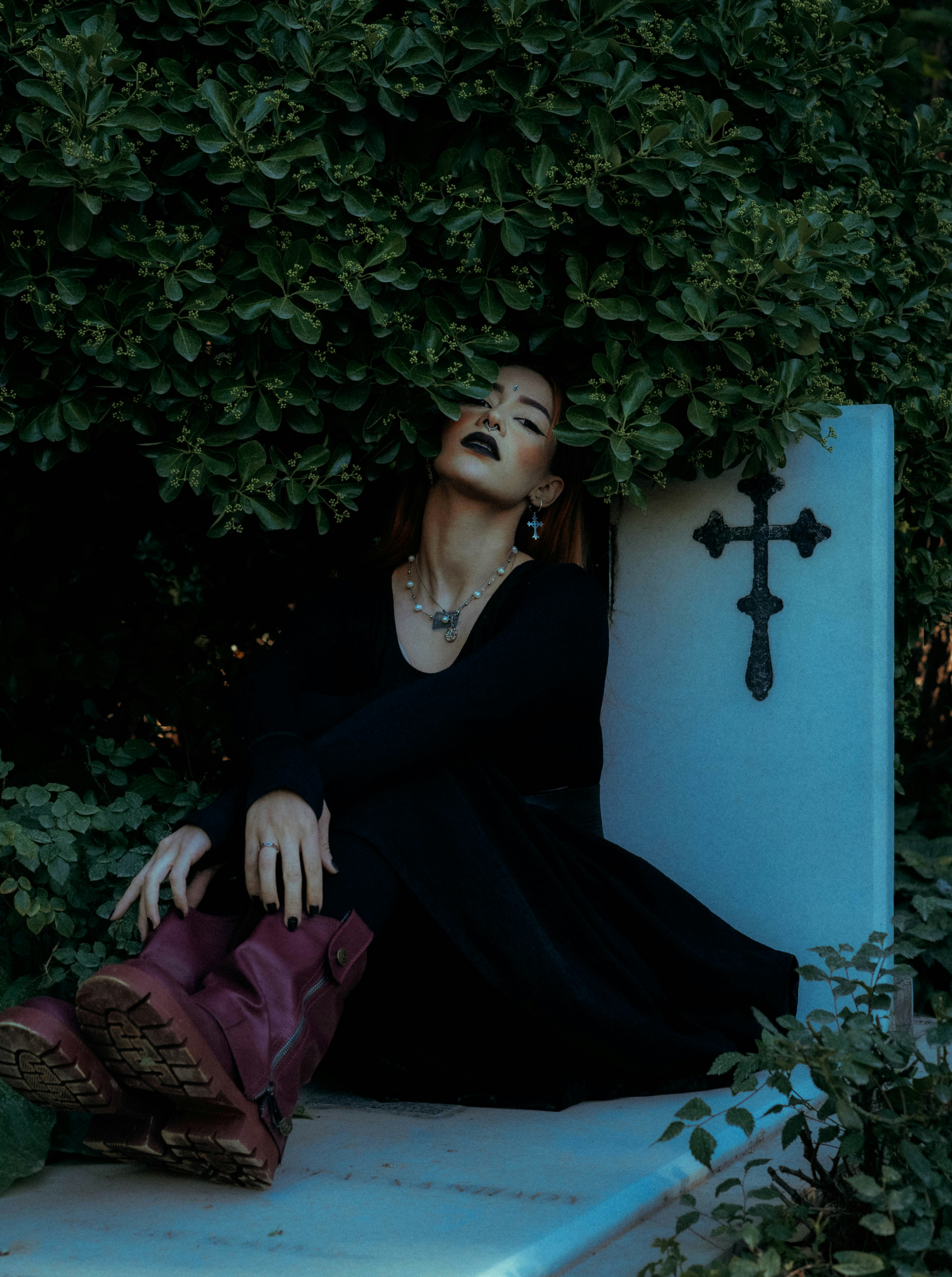 Veiled Quiet: A Portrait Hidden in the Foliage
