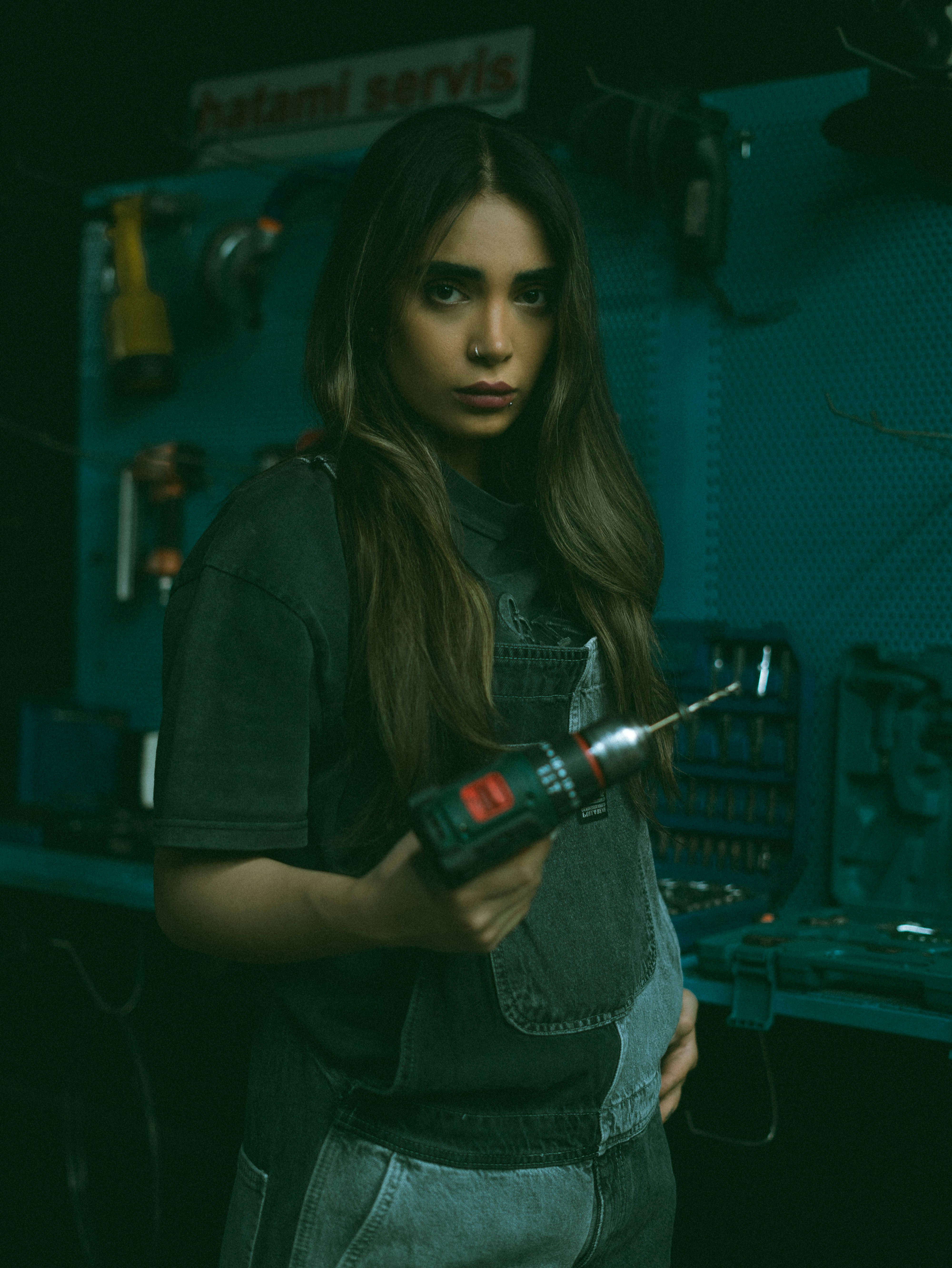 Portrait in a Dim Workshop: The Drill of Focus