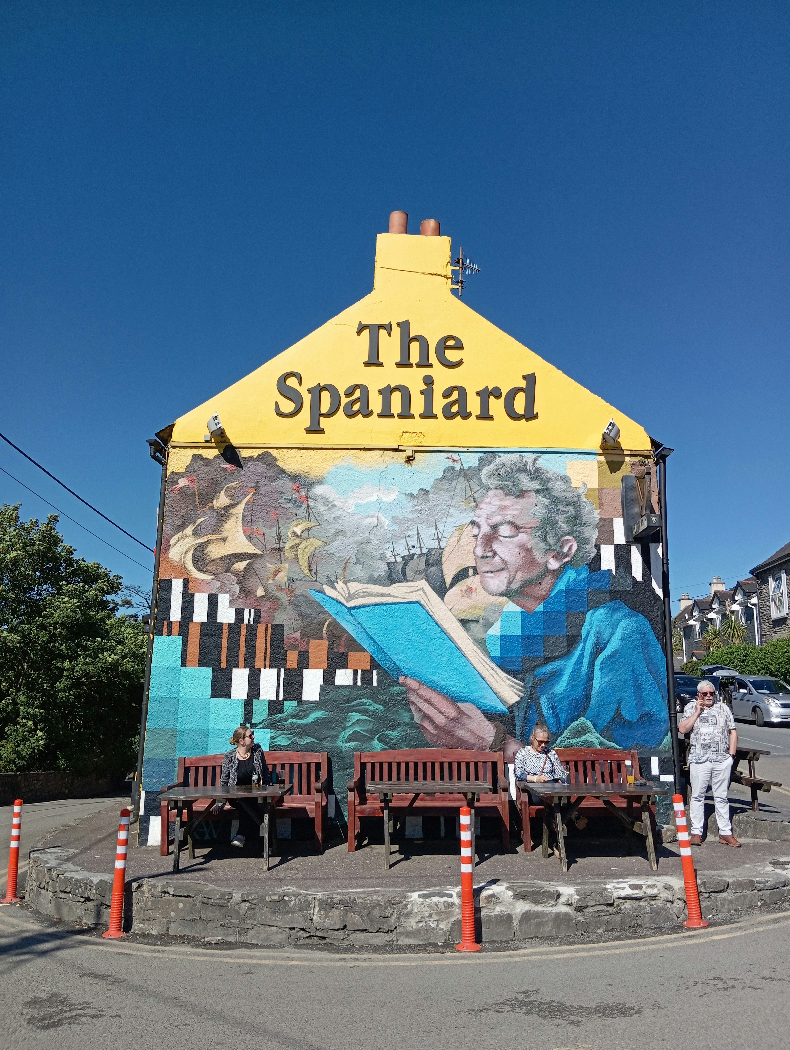 The Spianard Facade: A Painted Portrait in a Sunlit Street
