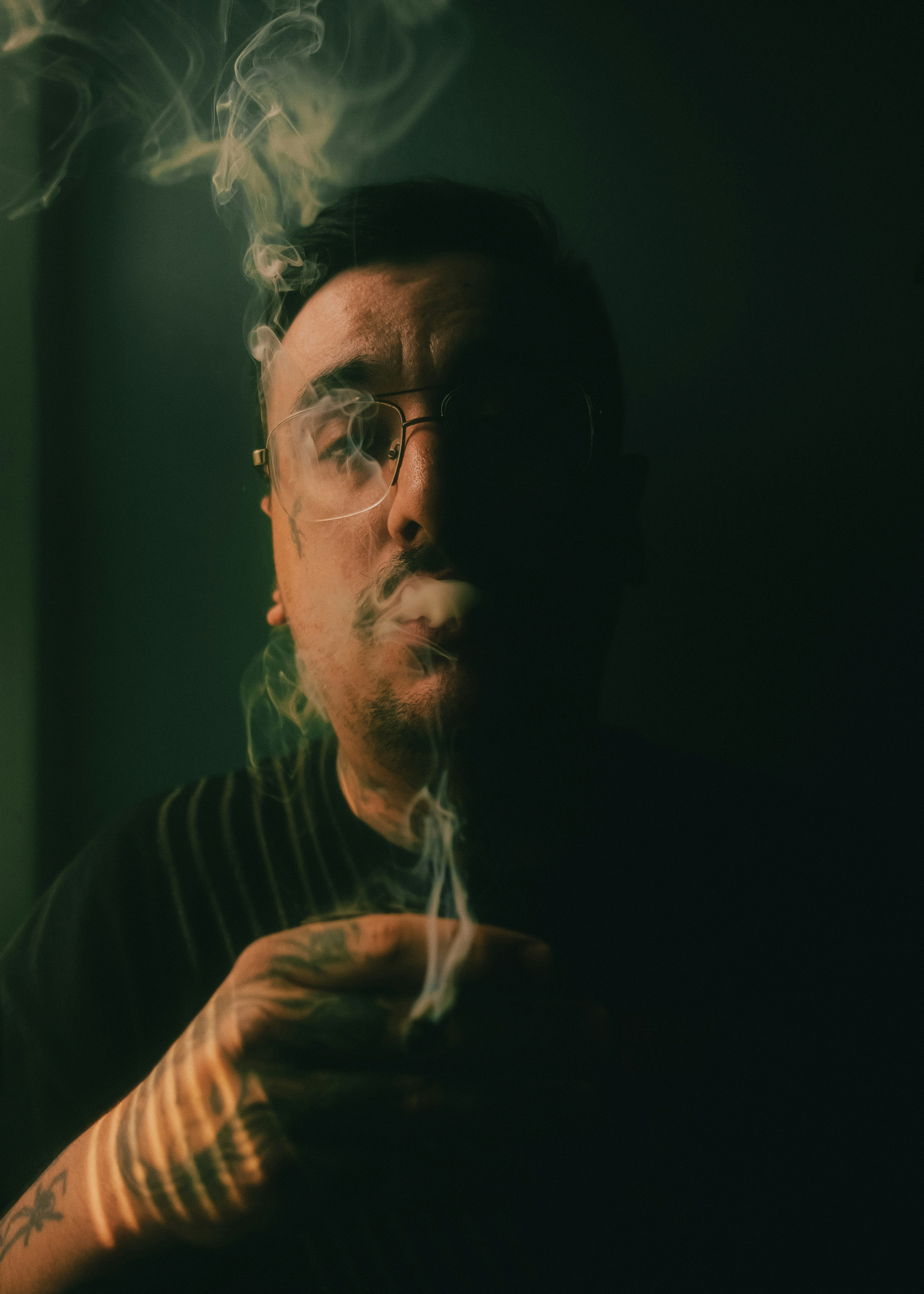 Smoke and Focus: A Quiet Portrait in Shadow and Steam