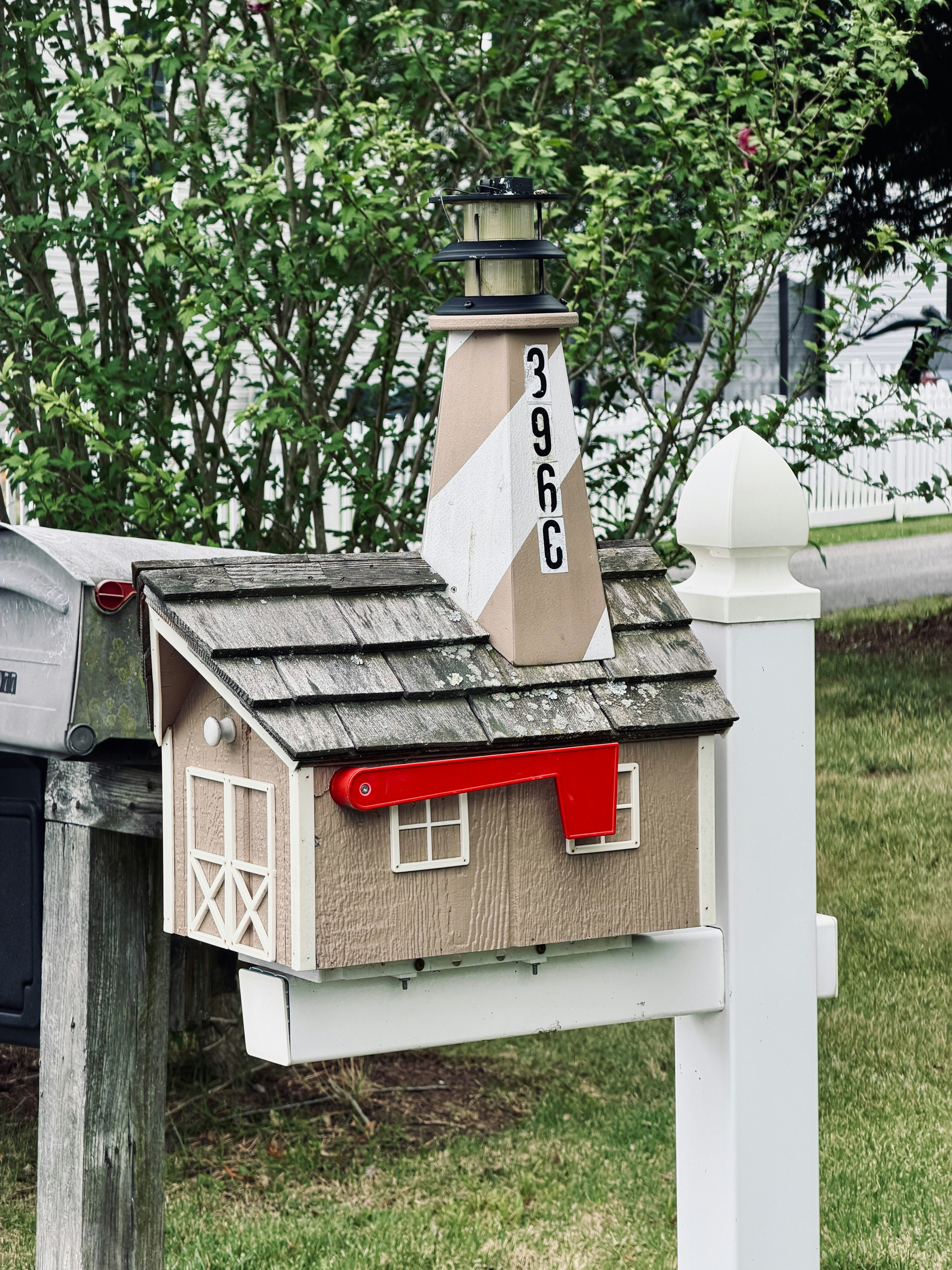 Whimsical Mailbox Stack: A Timbered House on a Post