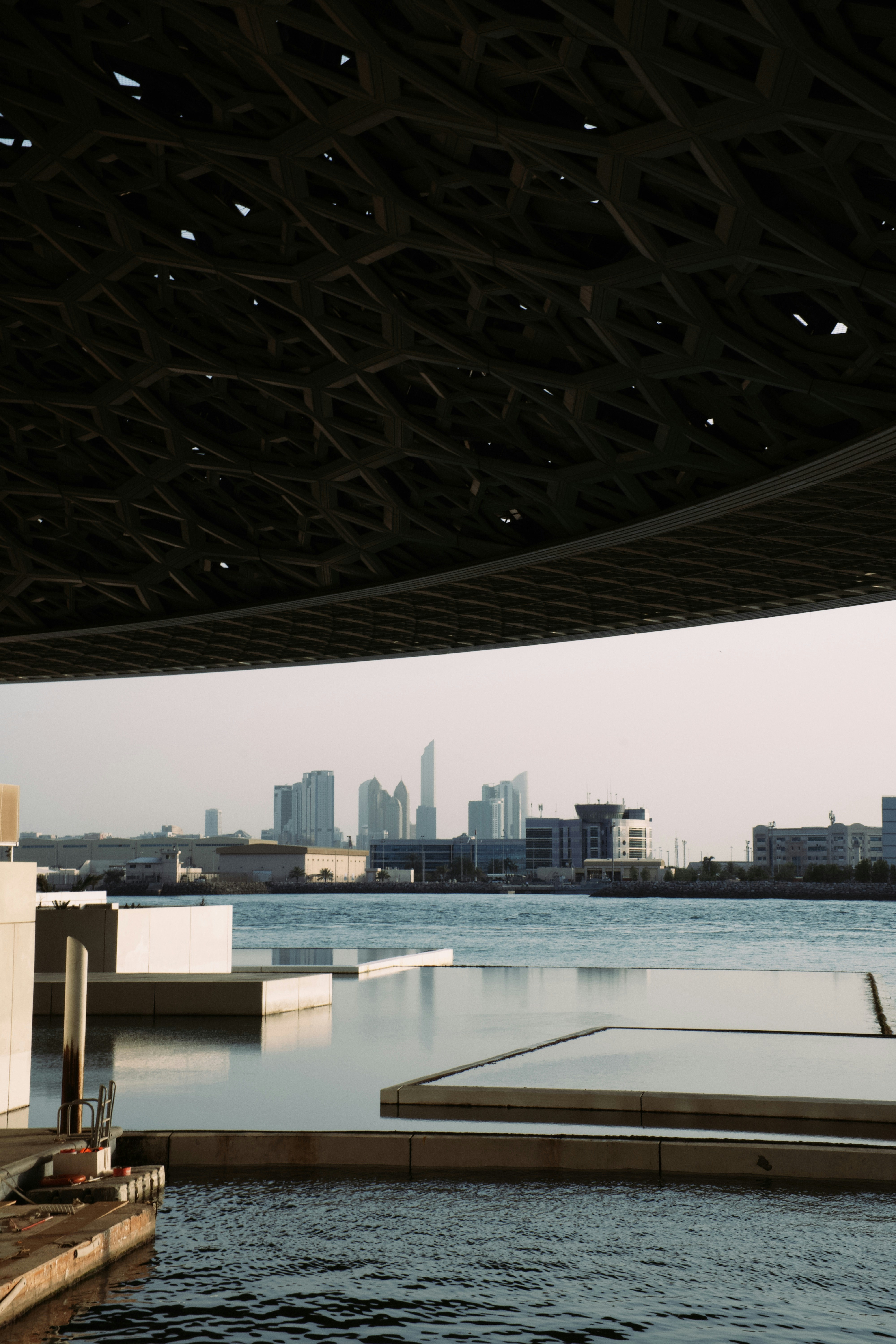 Under the Lattice Sky: Waterfront Geometry Framing the City