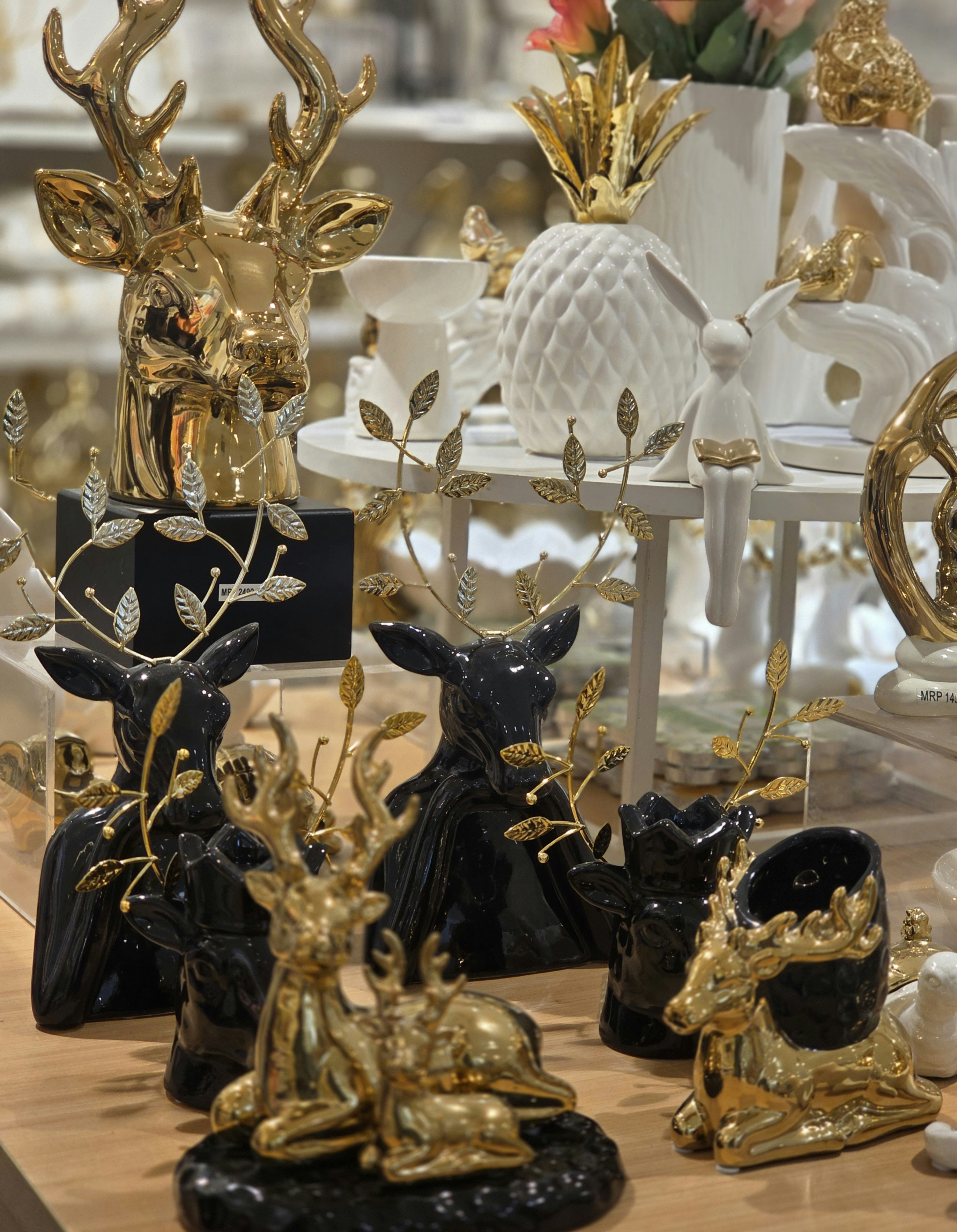 Golden Stag Parade: Studio Still-life of Metallic Figurines