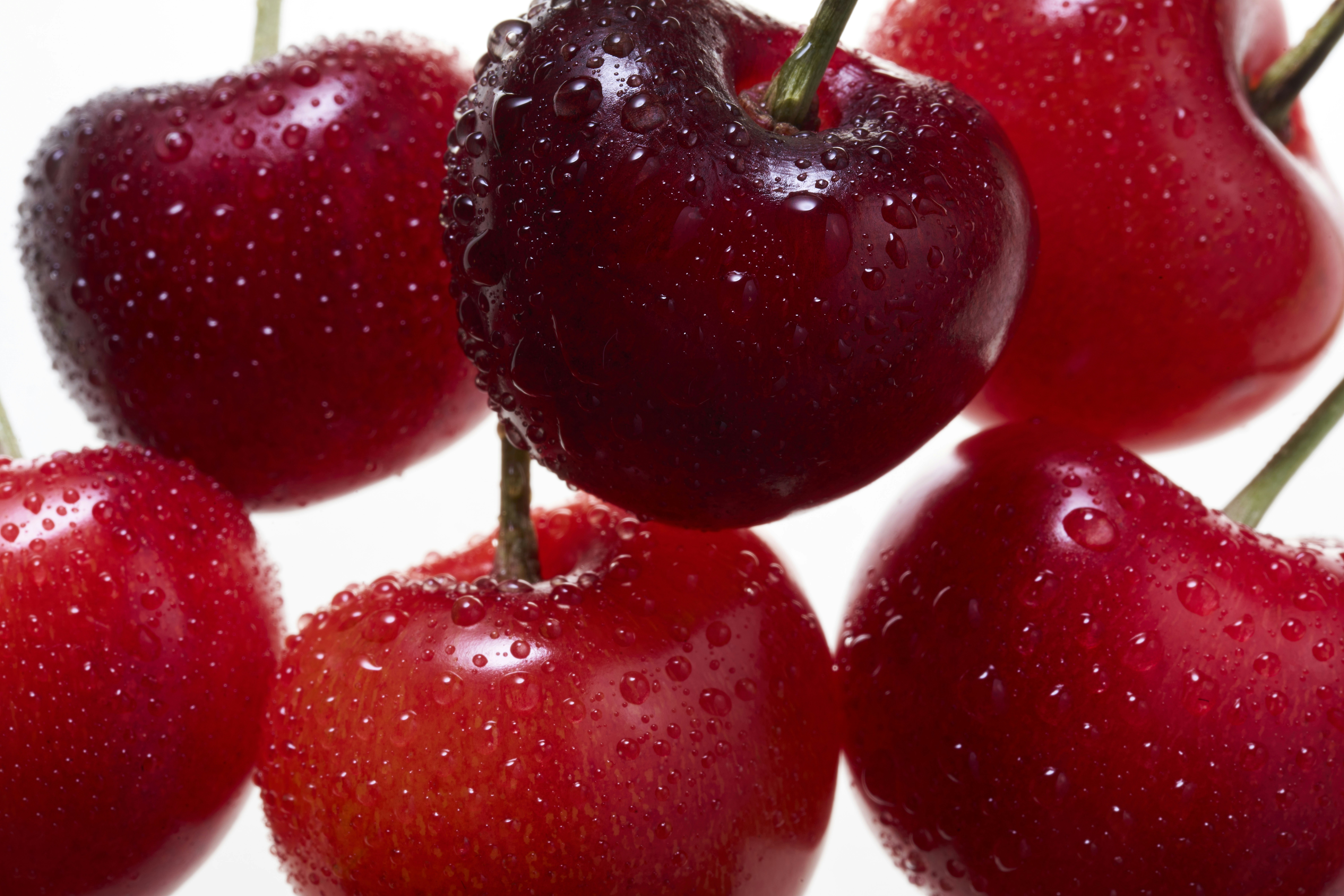 Close-Quarters Cherries: Glossy Droplets and Velvet Red
