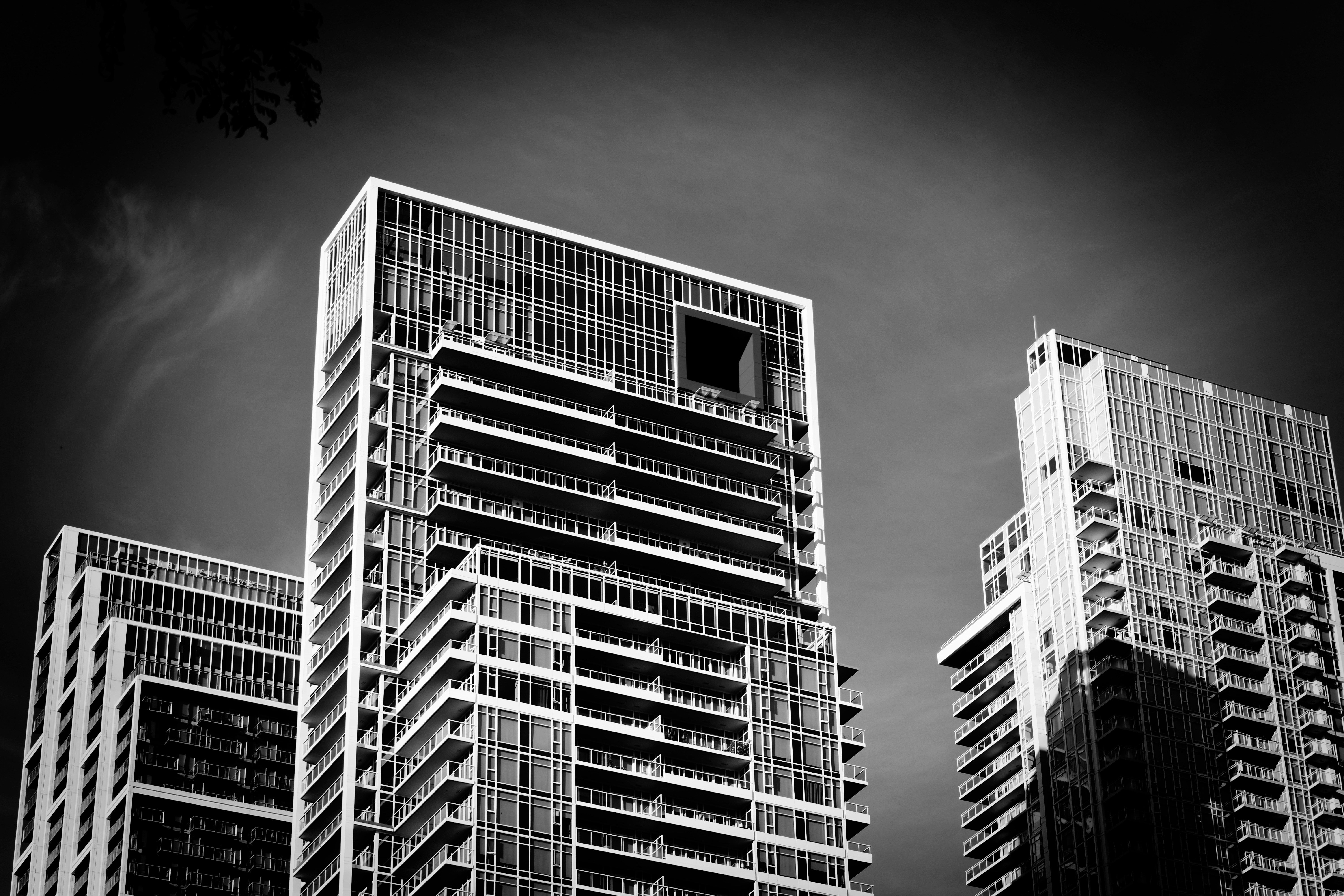 Monolithic Towers Carved in Light and Shadow