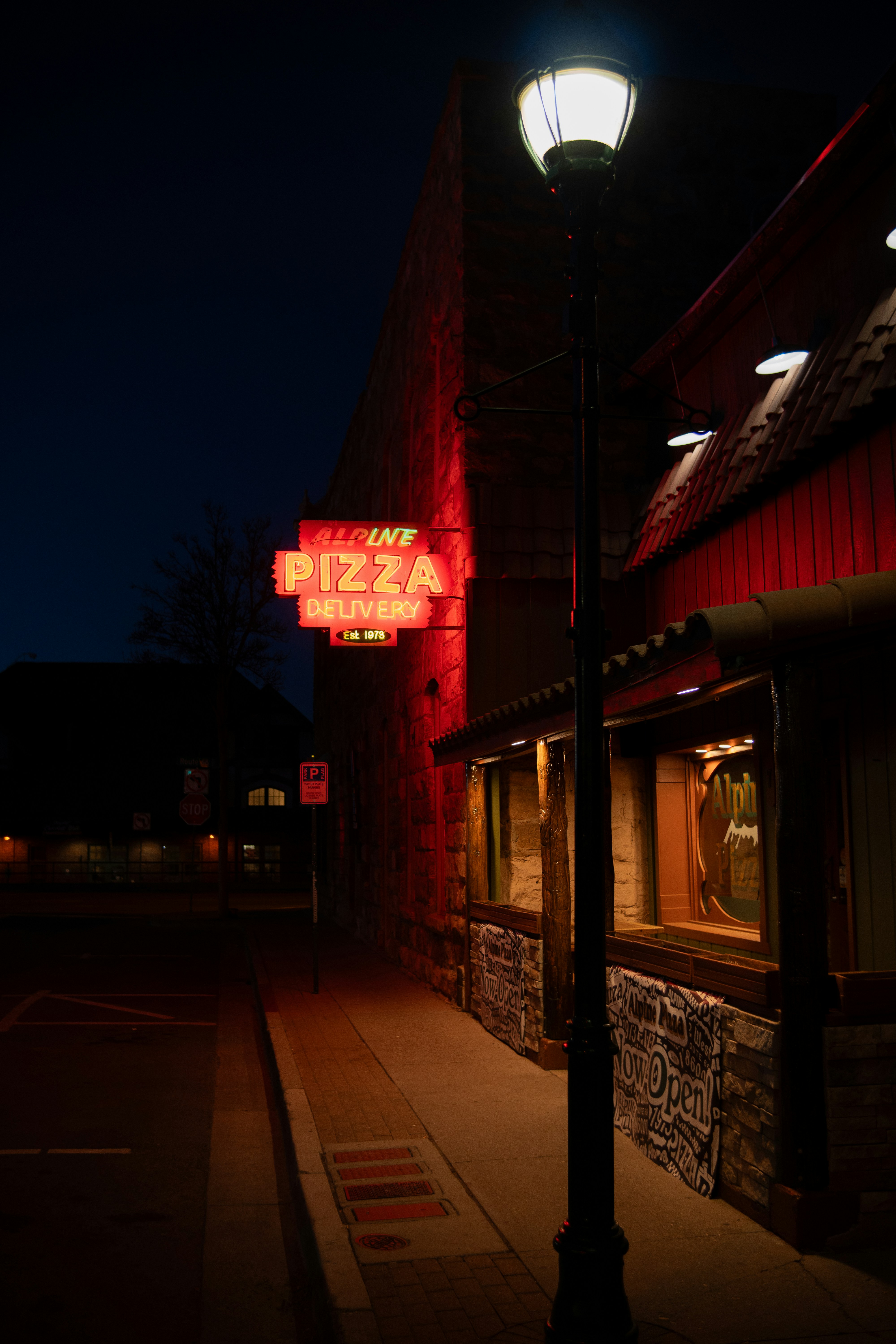 Neon Pizza Sign in the Quiet Night