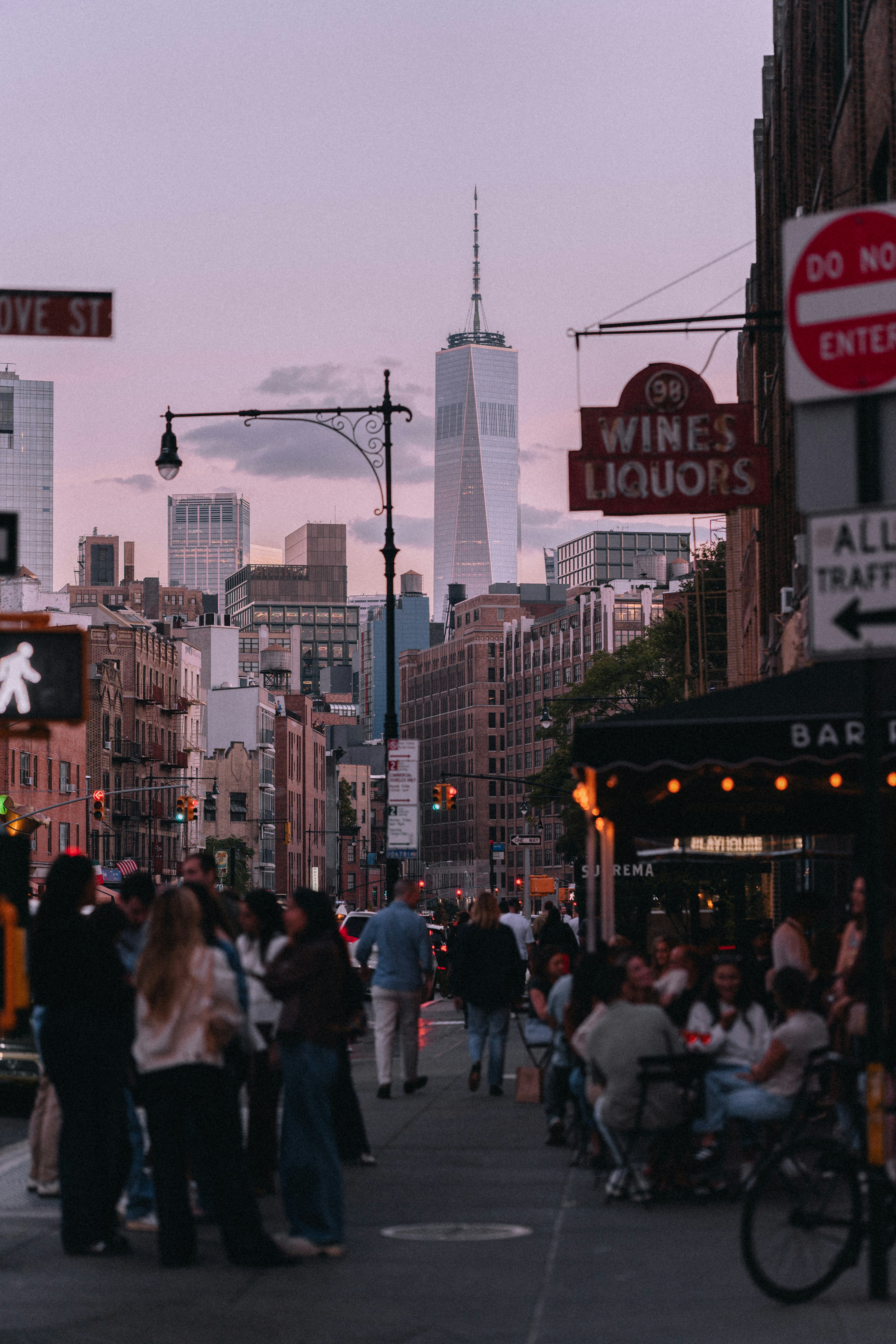 City Pulse: Evening Crowd Beneath the Sky‑Scraper